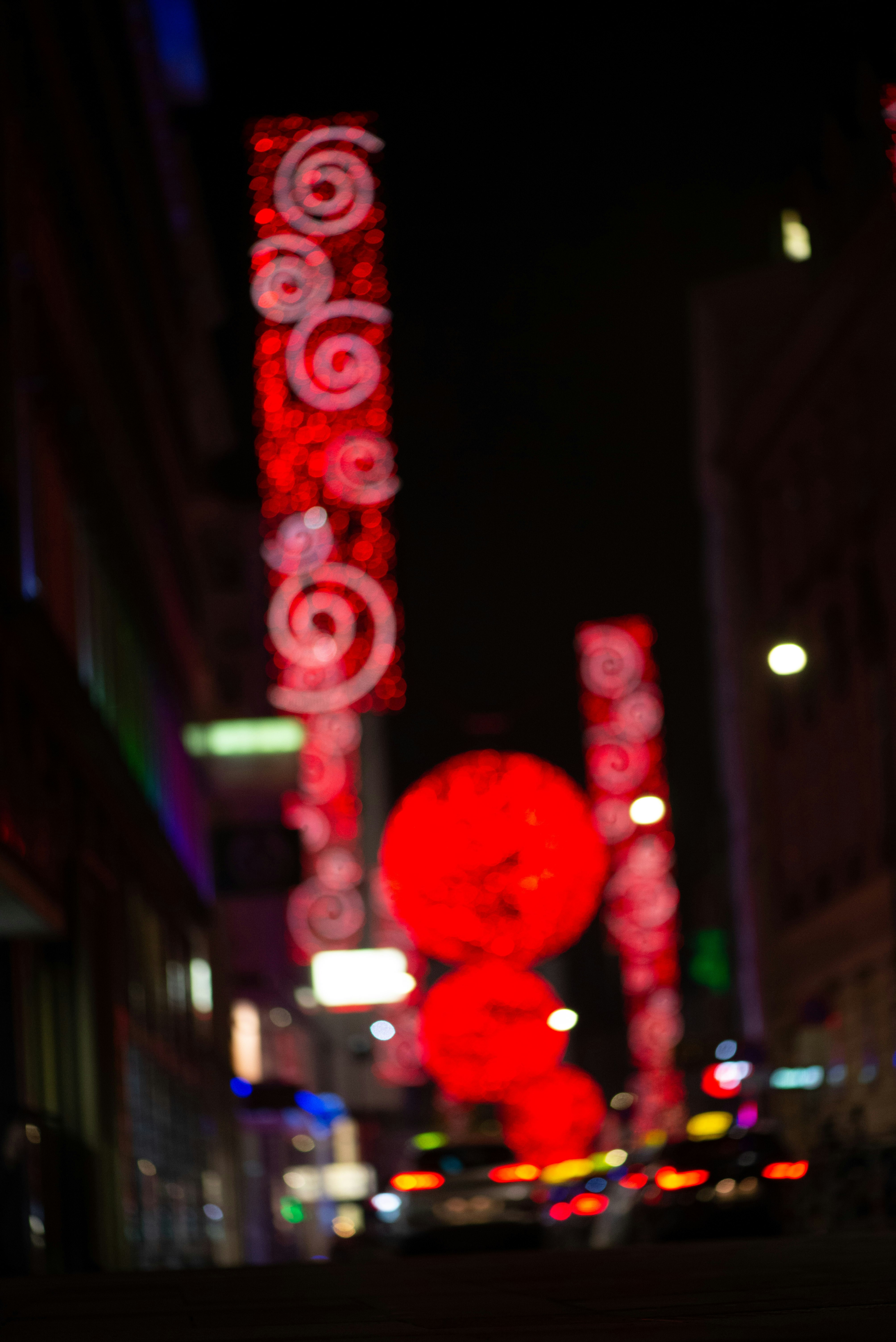 Red lanterns and decorations light up the street.