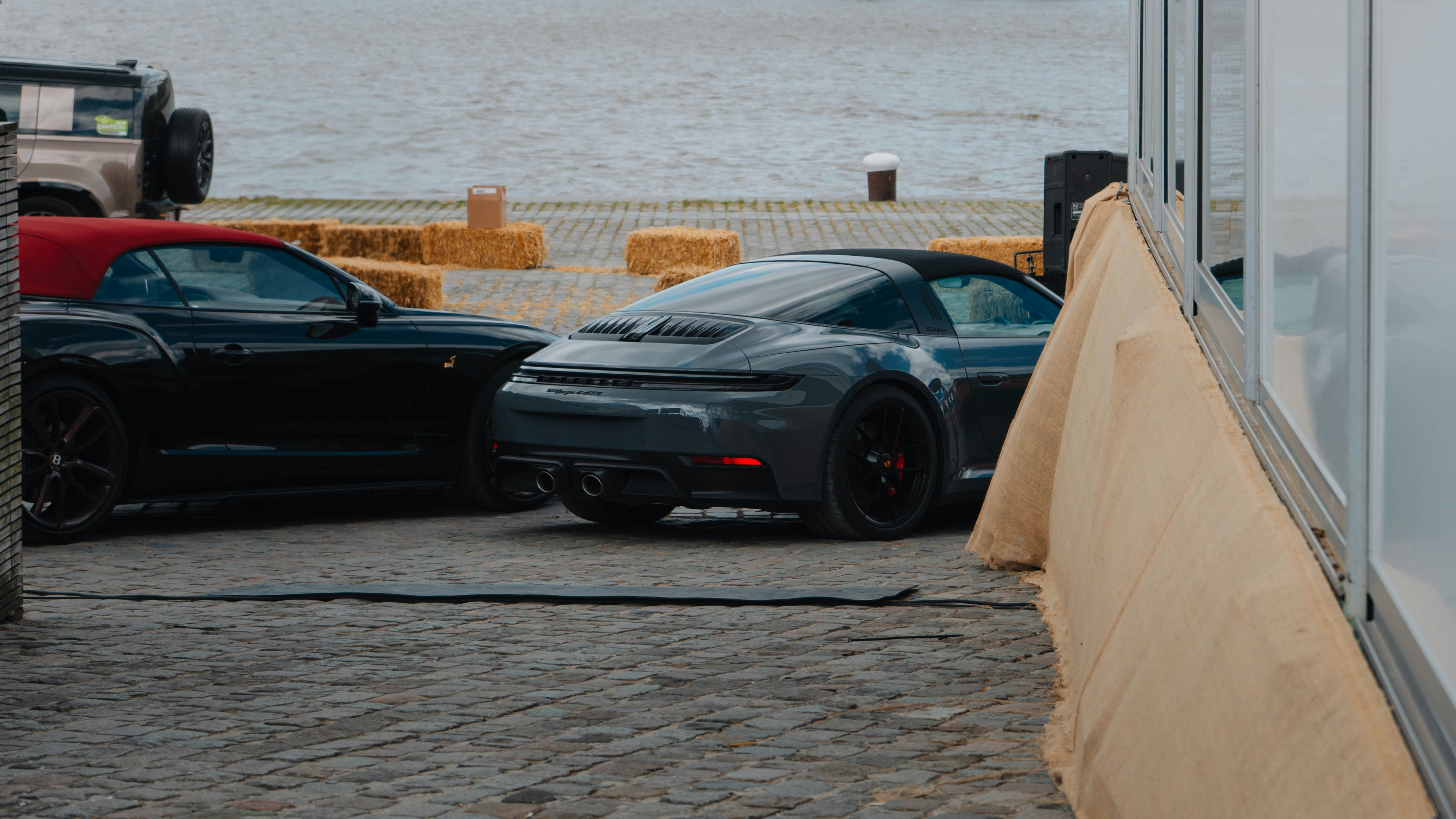 Coastal Showdown: Dark GTs Rest in the Paved Quiet
