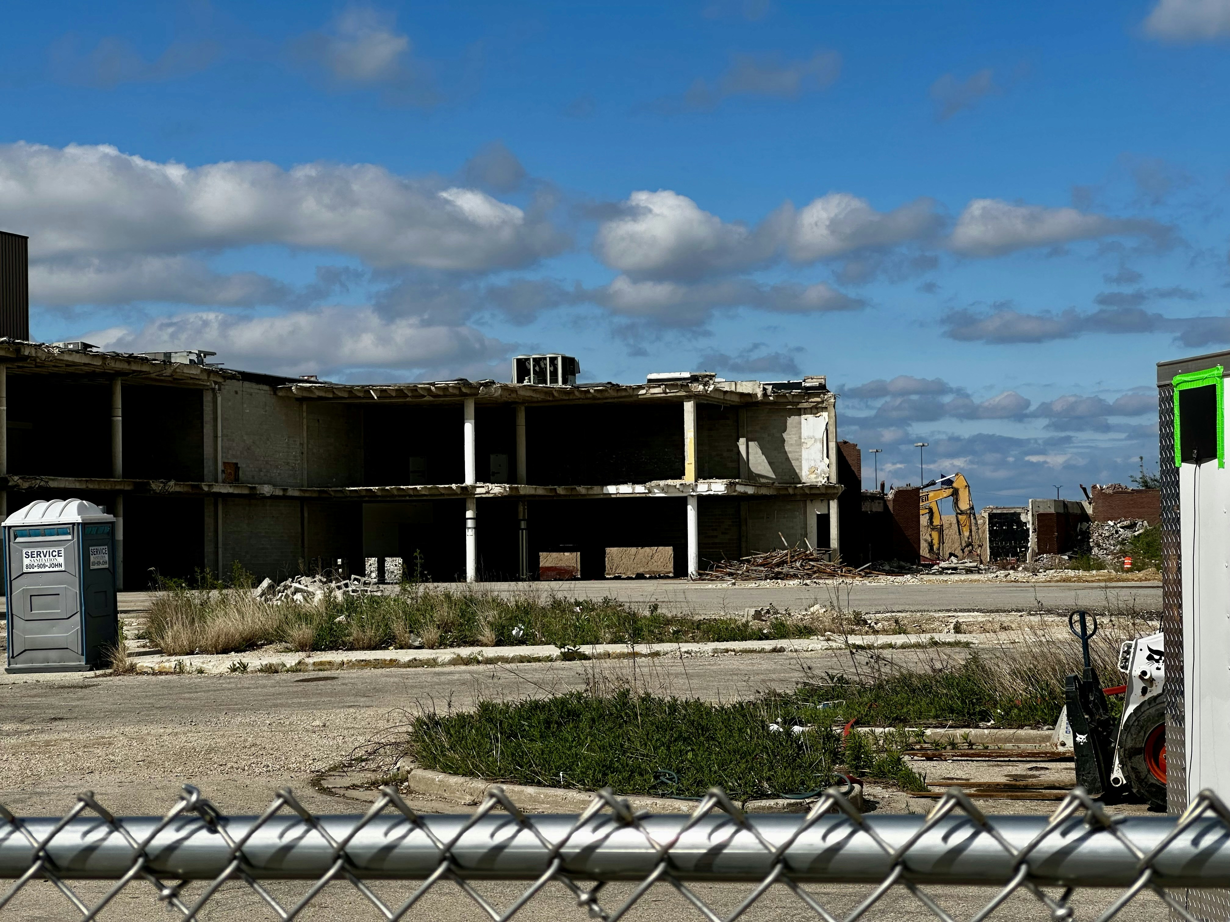 Concrete Skeleton Under a Wide Blue Sky: A Deserted Jobsite