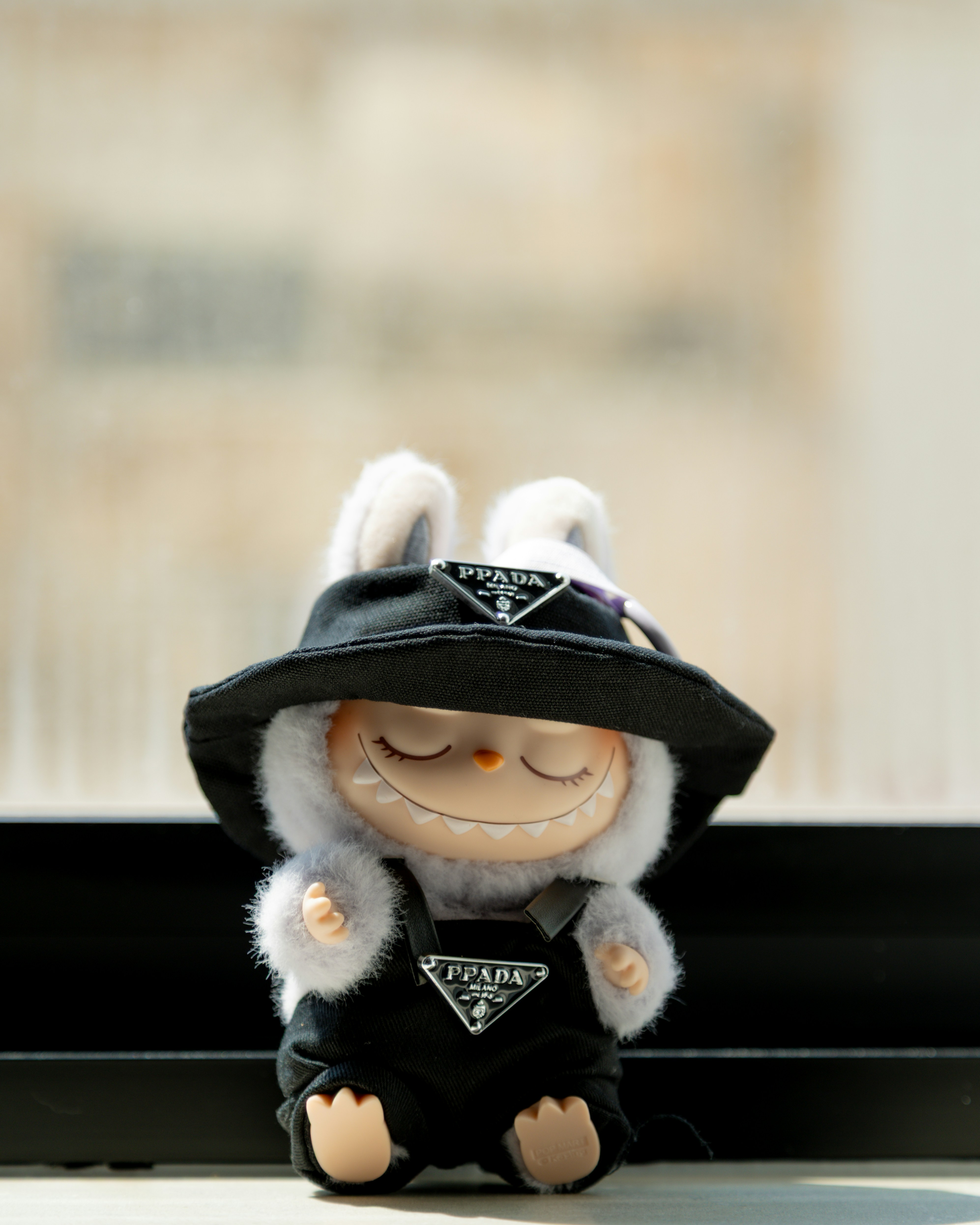 Stuffed animal wearing fashionable prada clothing. photo – Free Human ...