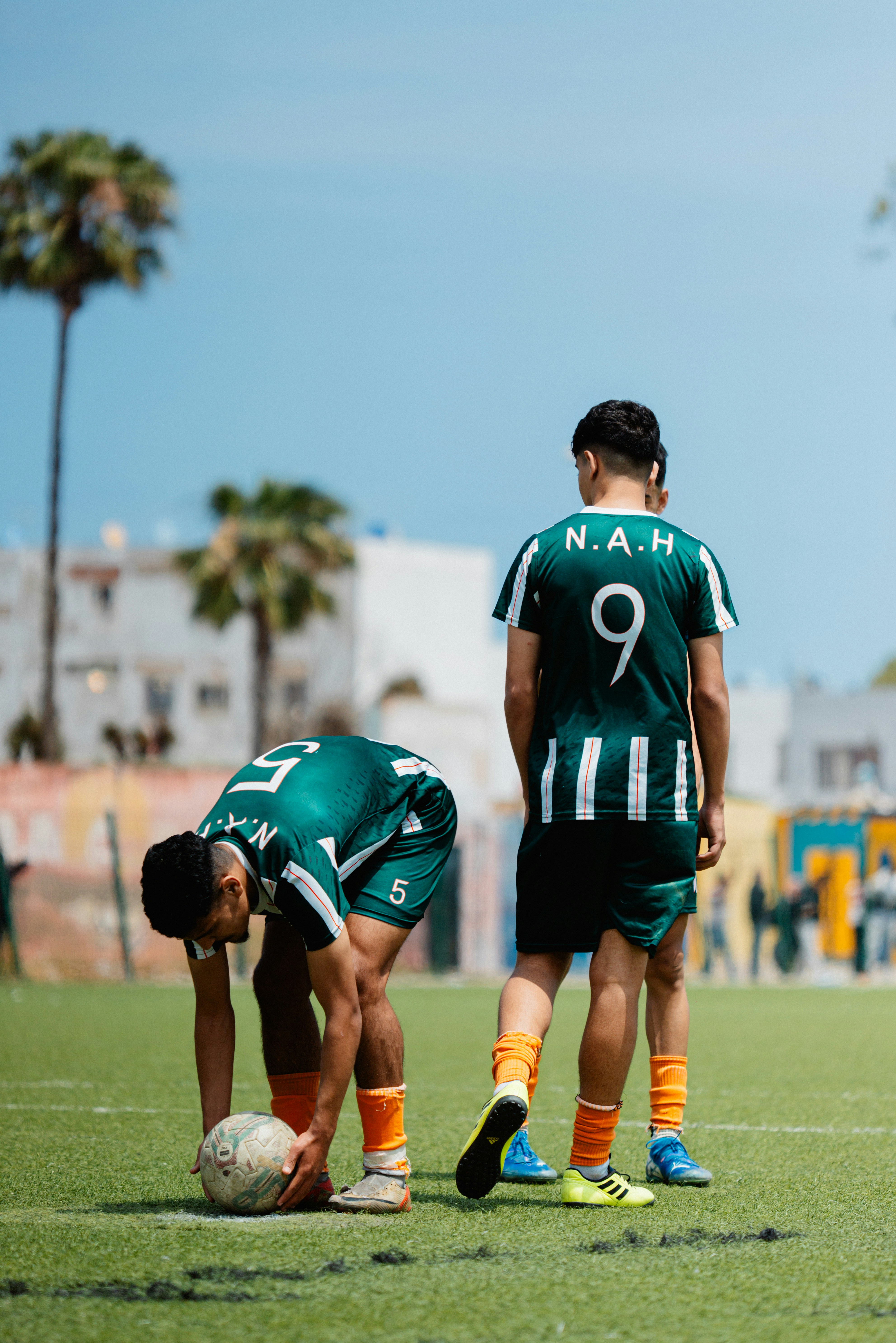 Team Ritual: A Moment Before the Kick in Green and White