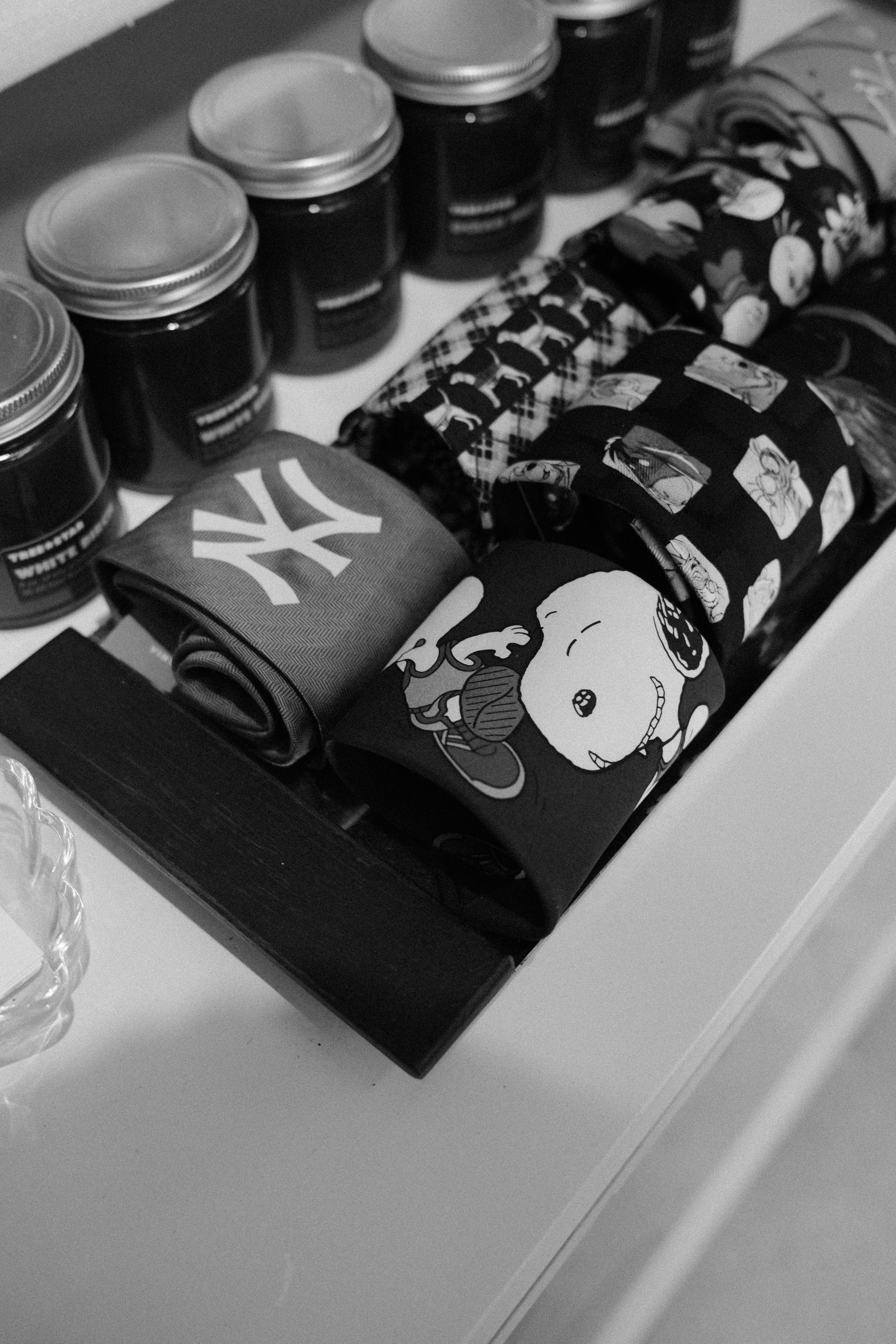 Tie collection displayed in a tray.