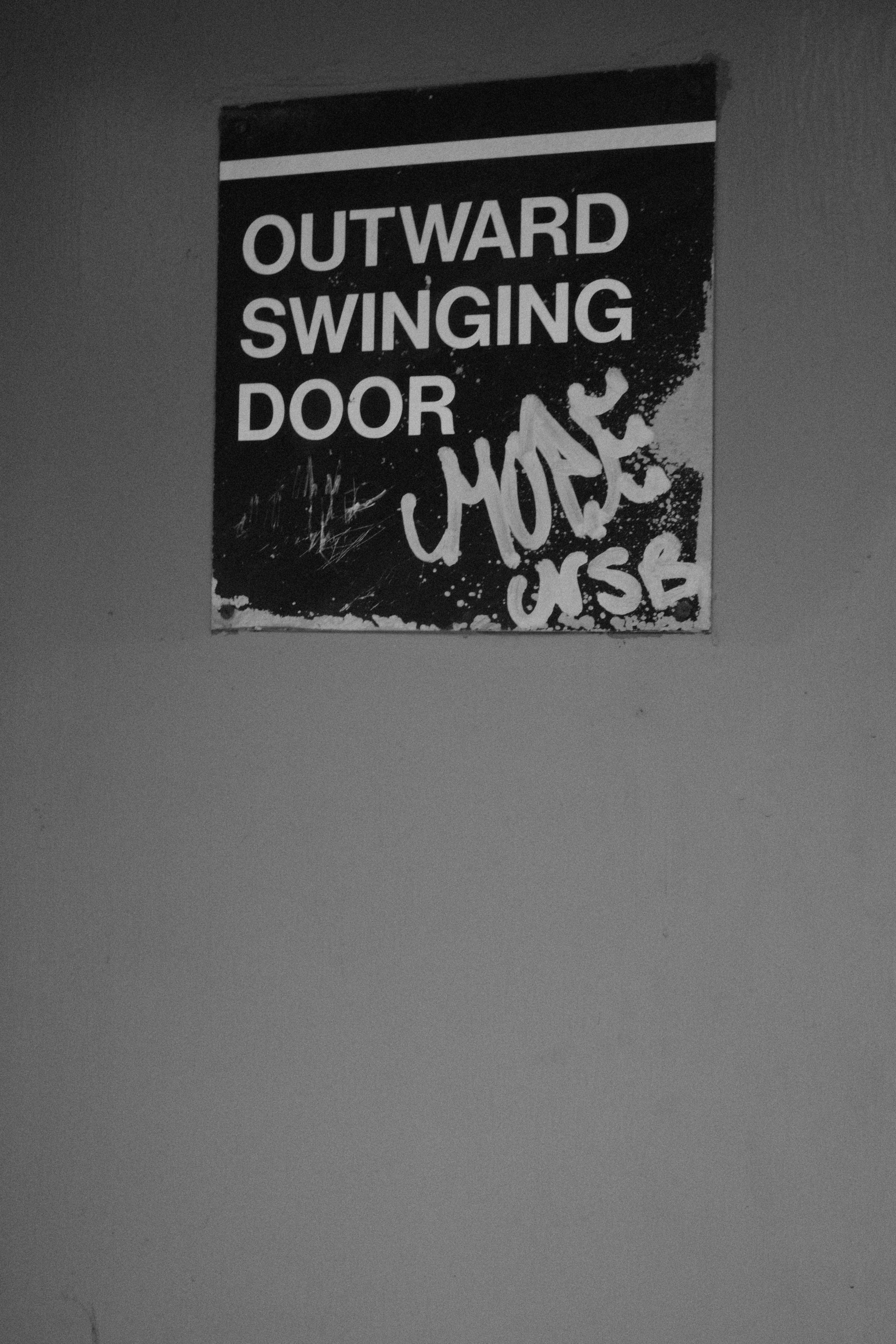 The image shows an "outward swinging door" sign. photo – Free Street ...