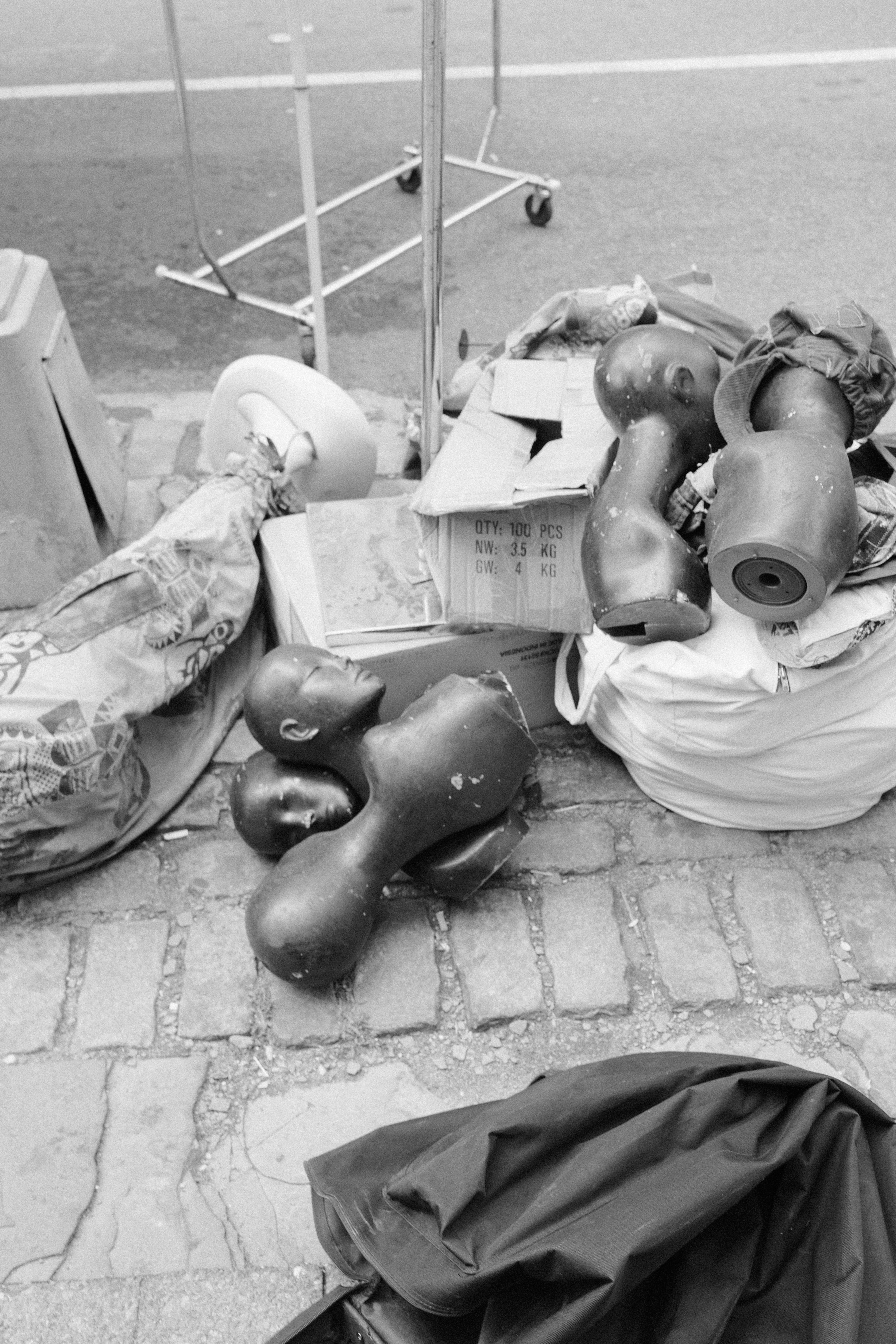 Discarded mannequins and trash on a city street. photo – Free Street ...