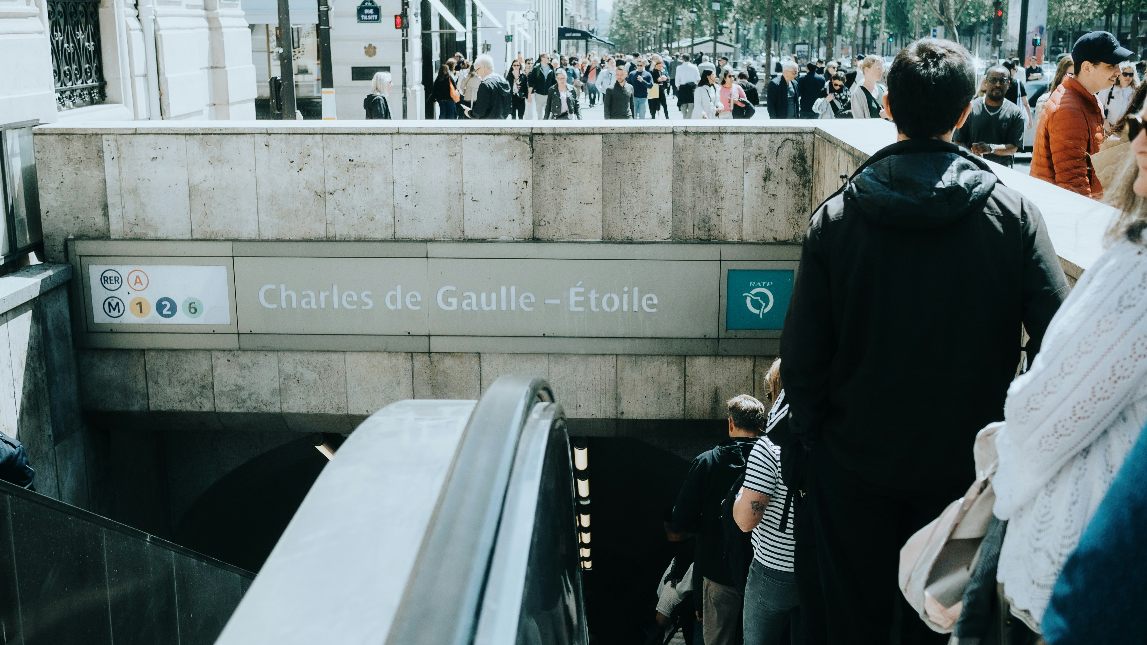 Arc and Ascent: Daily Pulse at Charles de Gaulle–Étoile Metro Entrance
