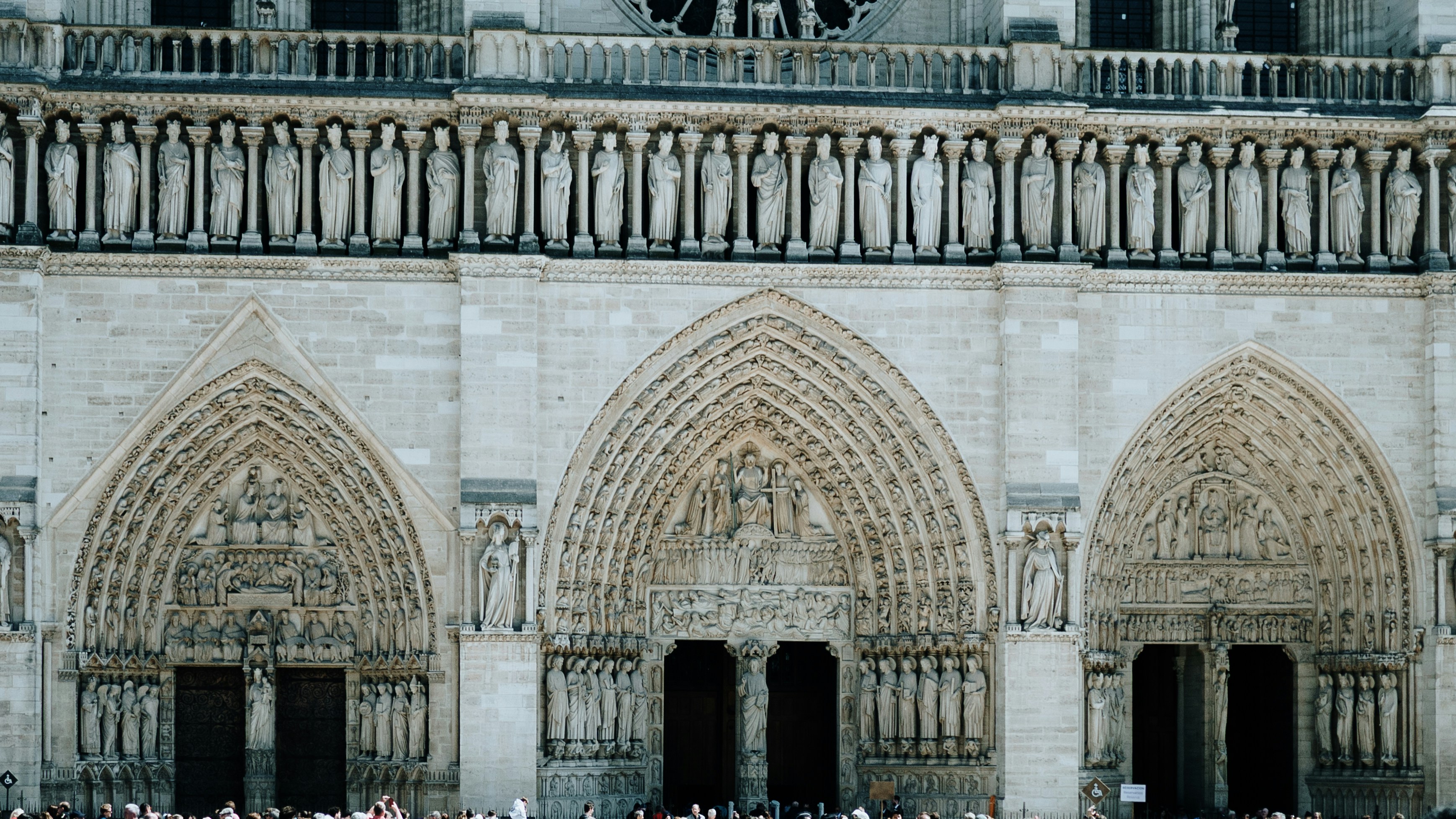 Three Arched Portals: Carved Chronicle on a Cathedral Facade