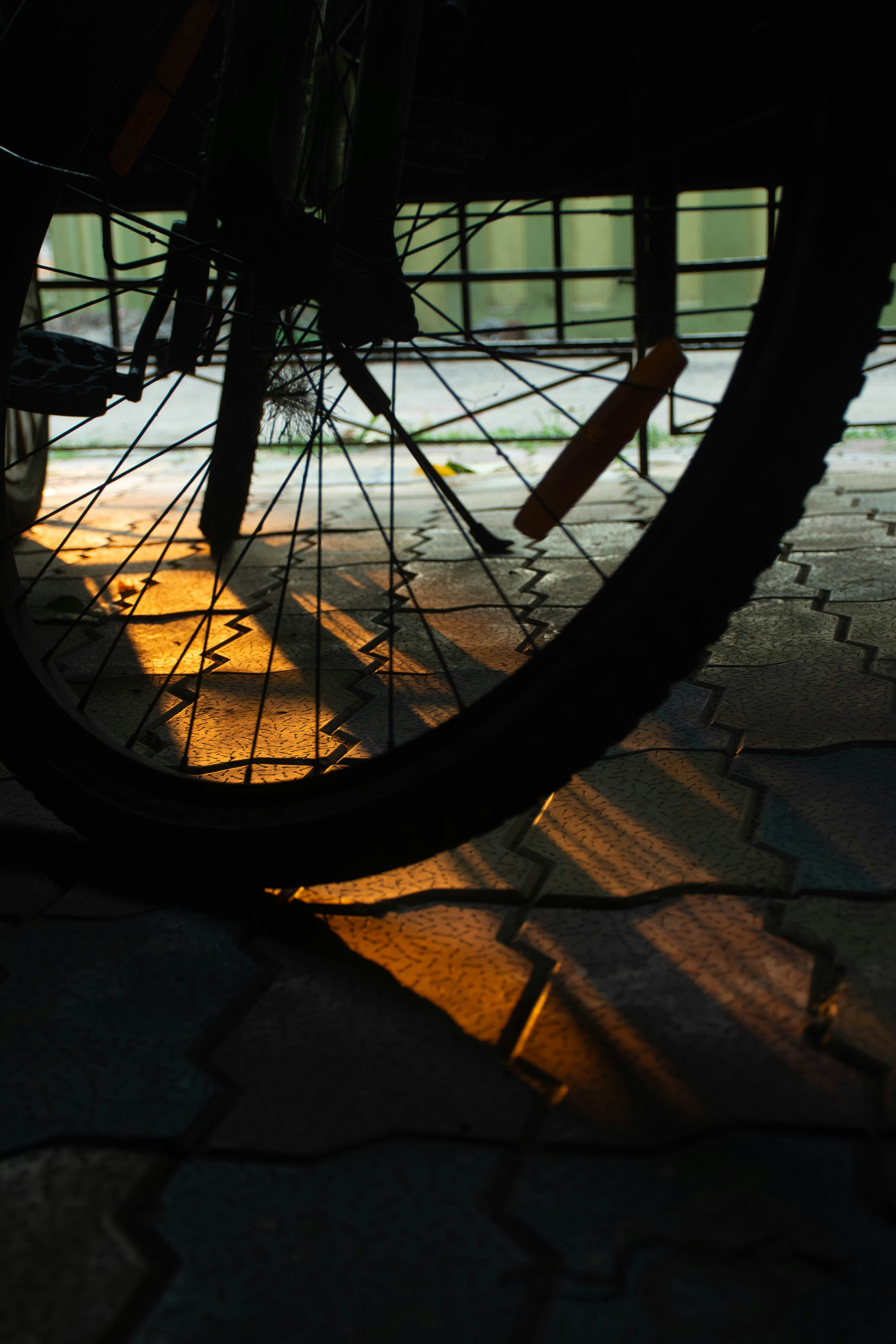 Amber Reflections on a Bicycle Wheel: Quiet Focus