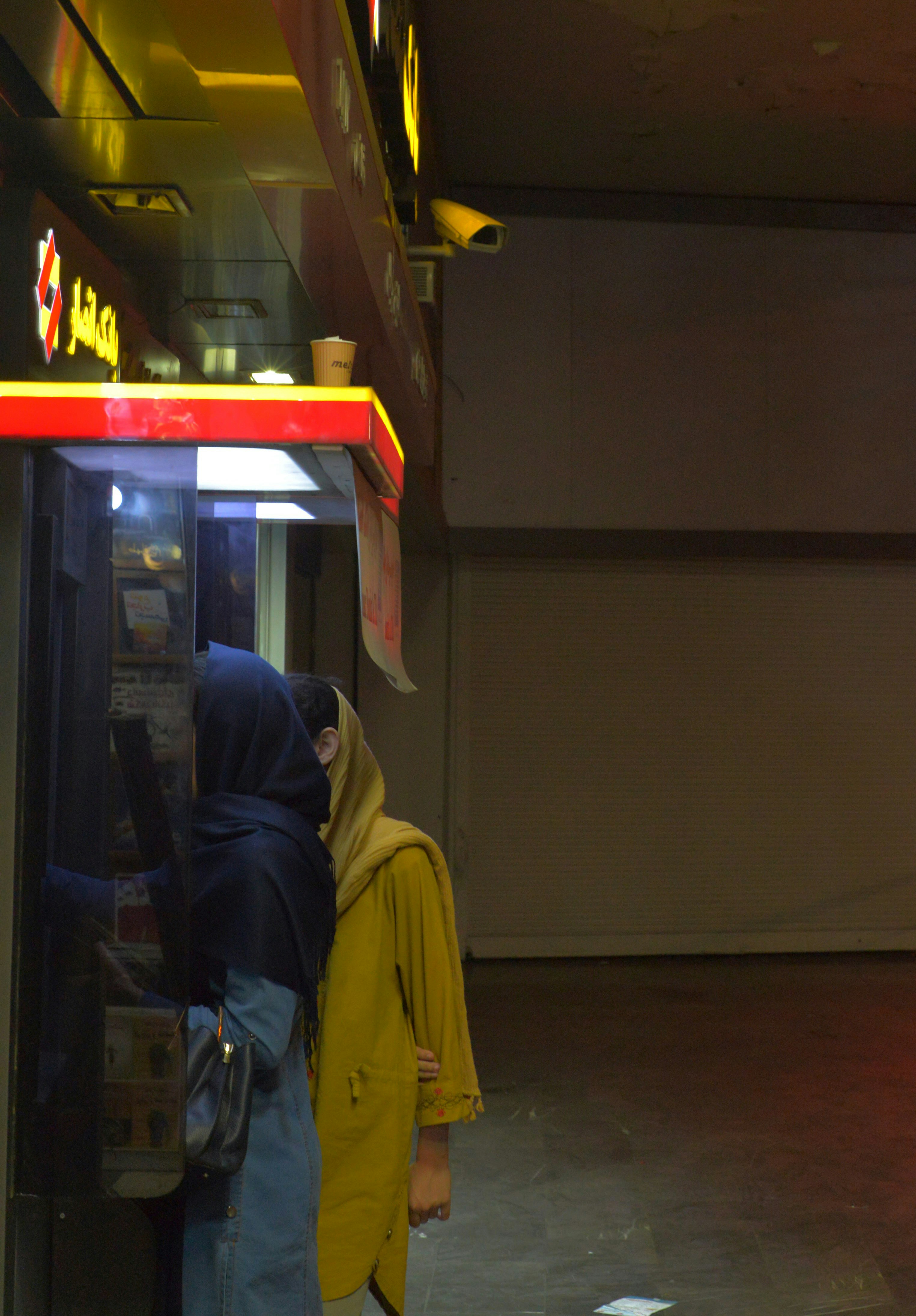 Neon Encounter at a Quiet Snack Window