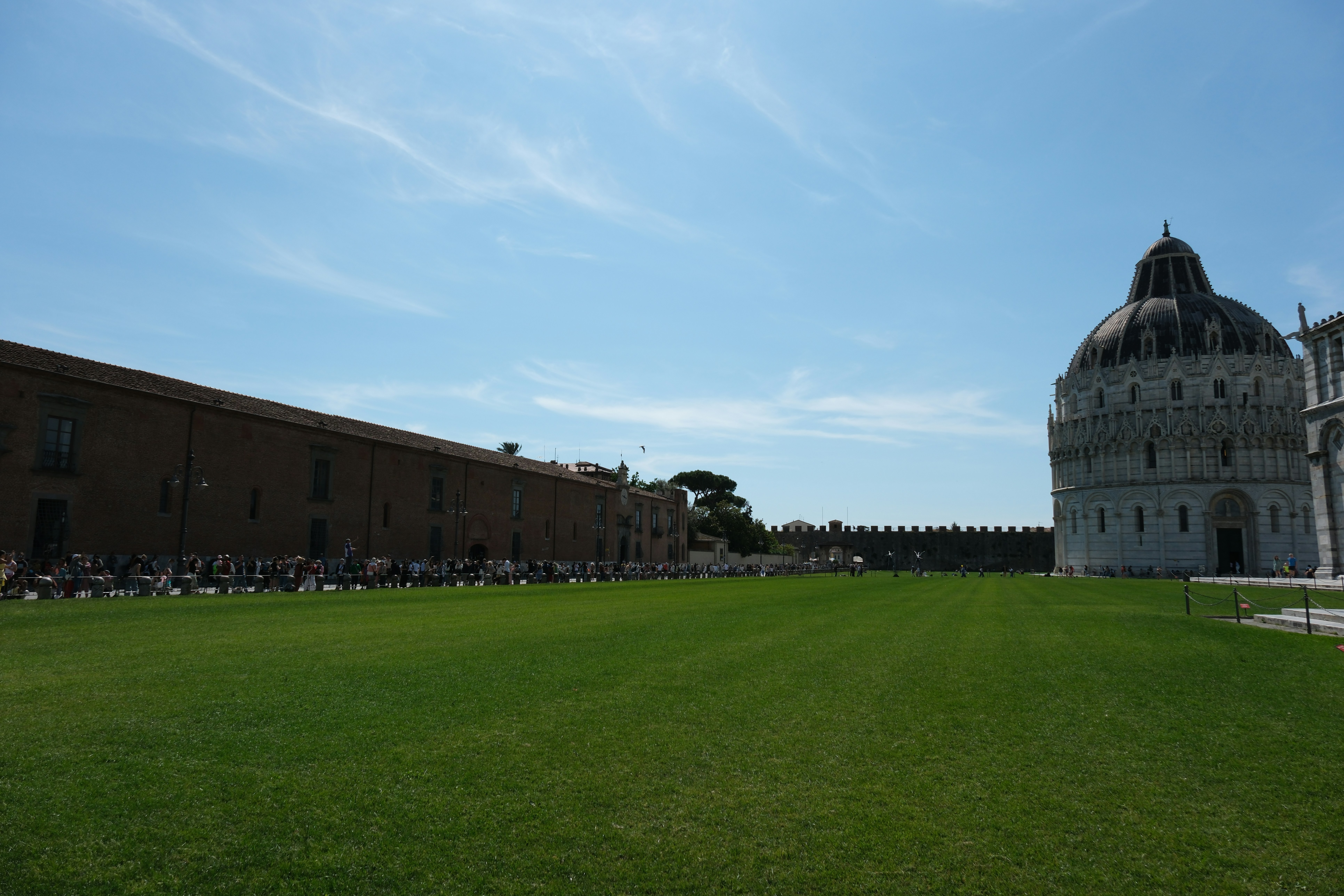 Green Field and Romanesque Domes at Piazza dei Miracoli