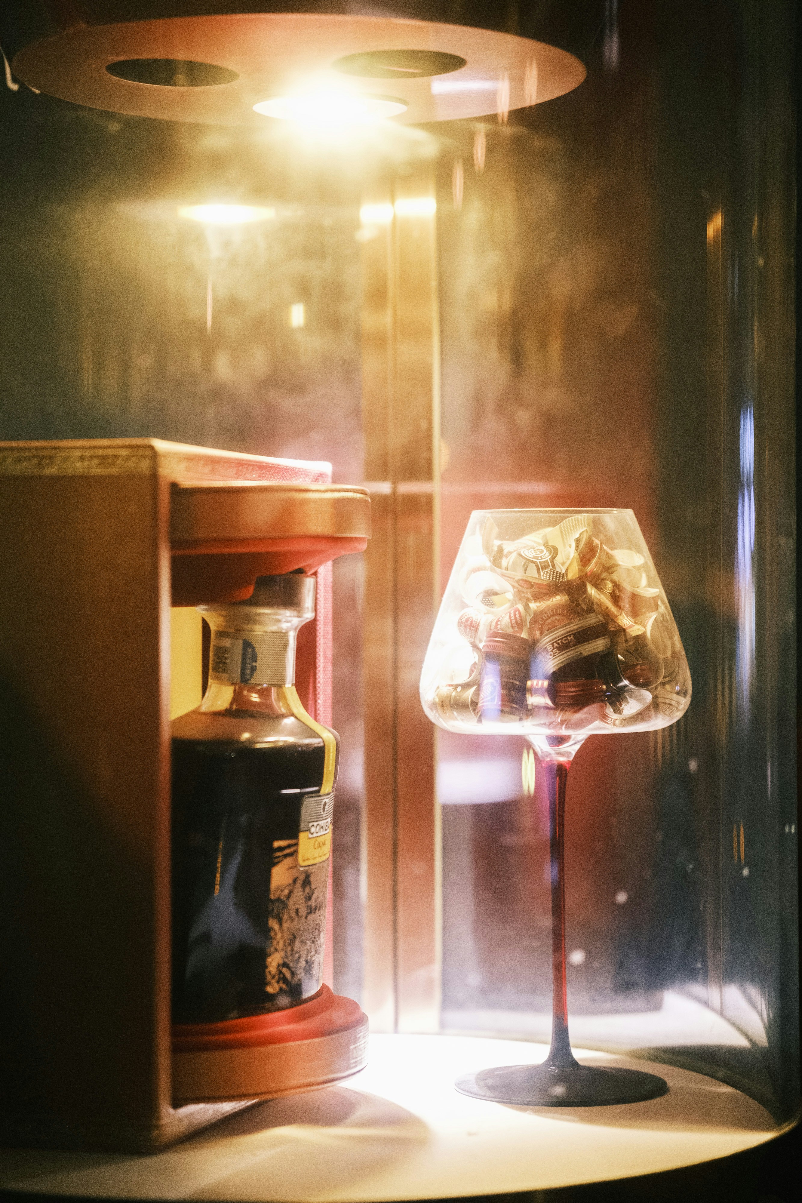 Gilded Whiskey Glass: a Quiet Glow in a Glass Cabinet