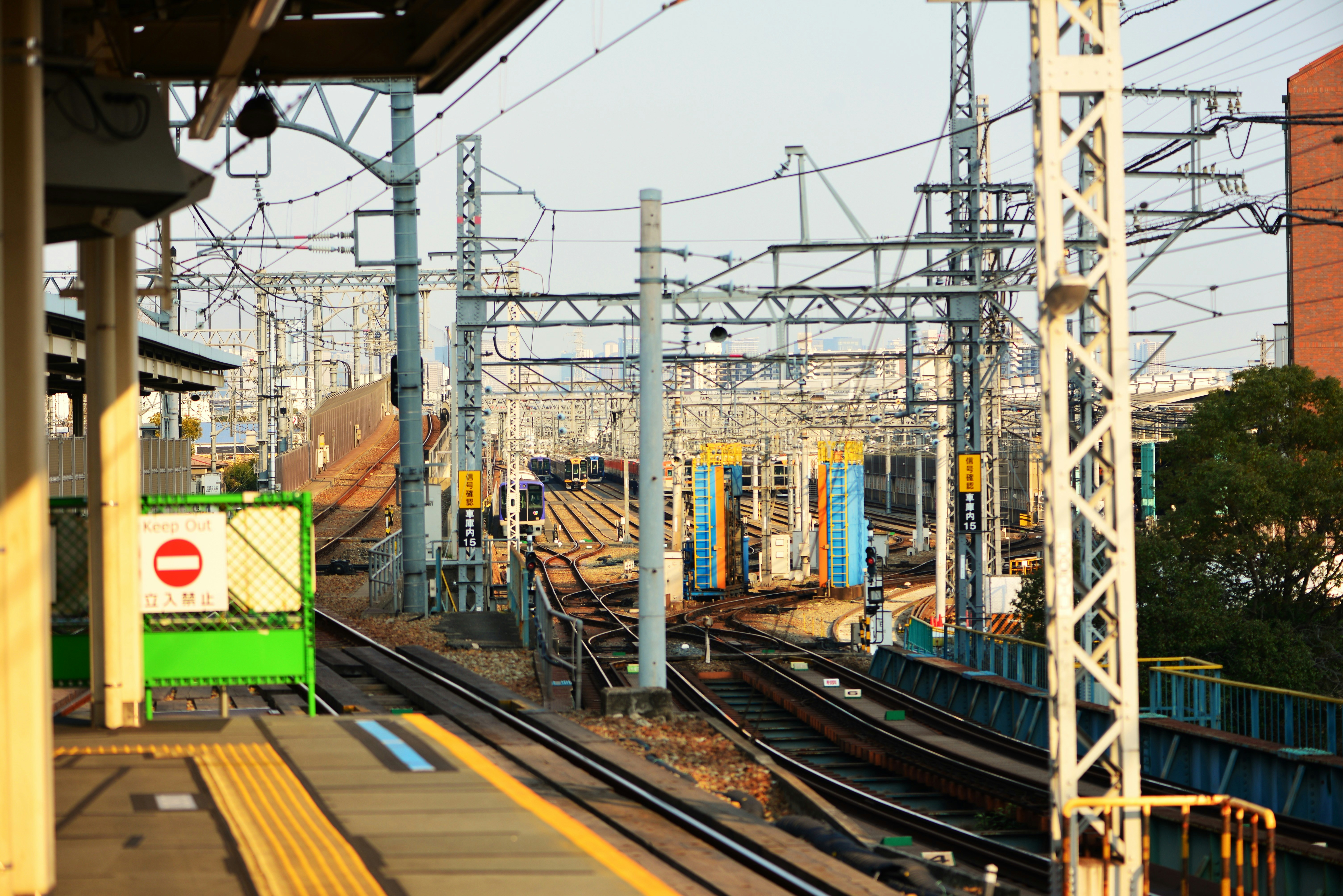 Railway Convergence: A Busy Freight Yard Under Clear Sky