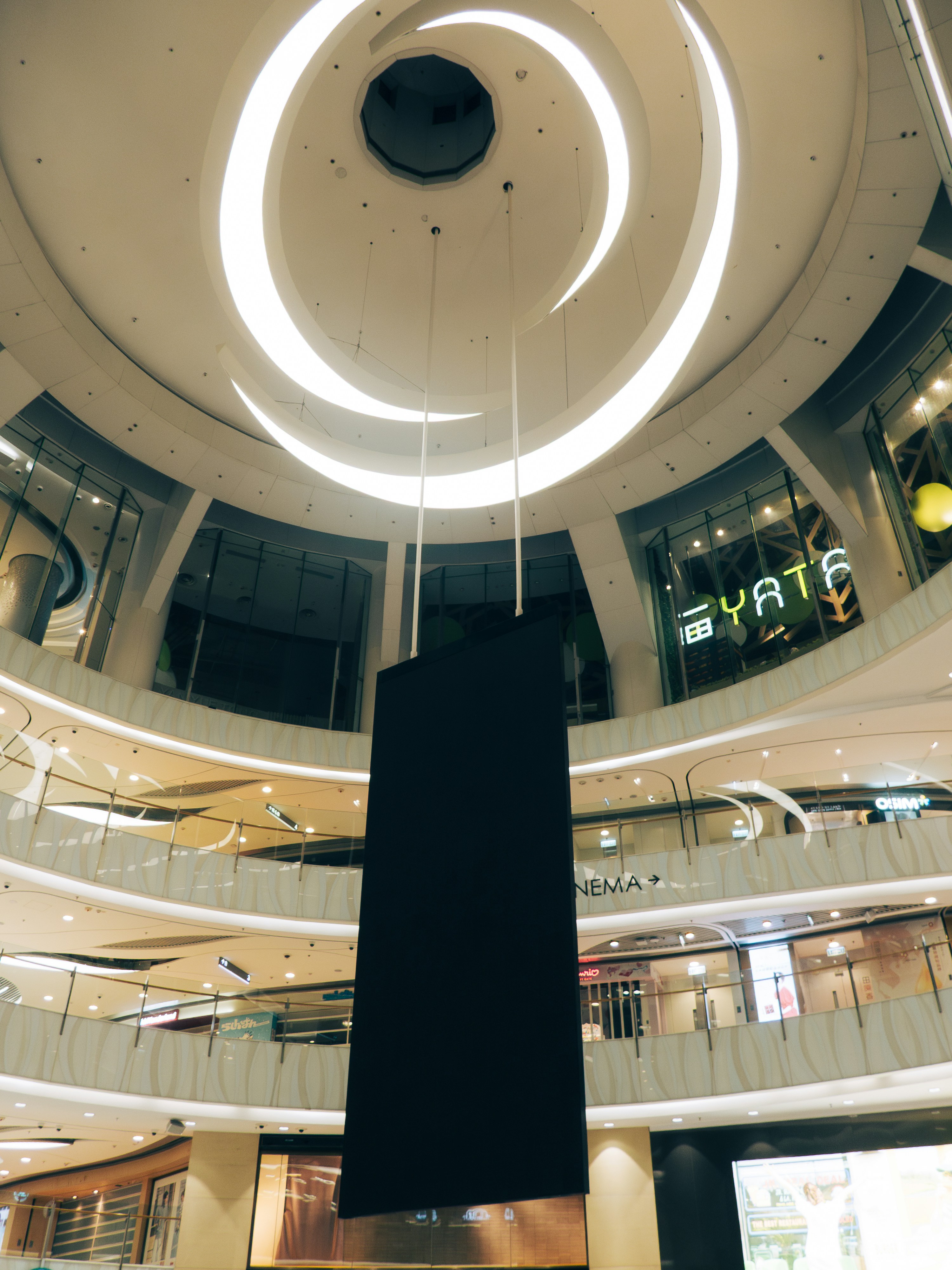 A modern mall interior with bright, circular lighting. photo – Free ...