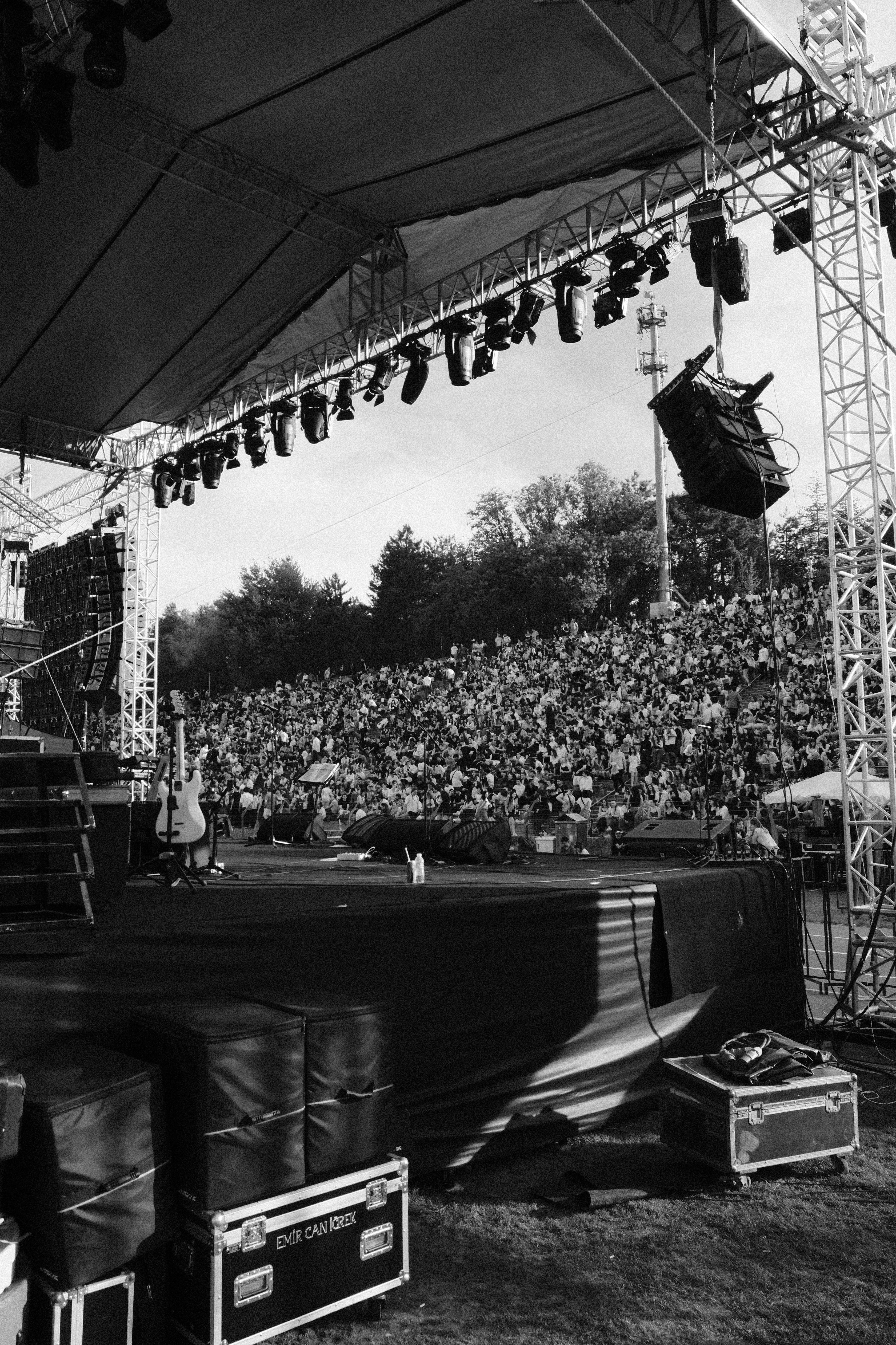 Open-Air Reverie in Monochrome: A Packed Outdoor Stage