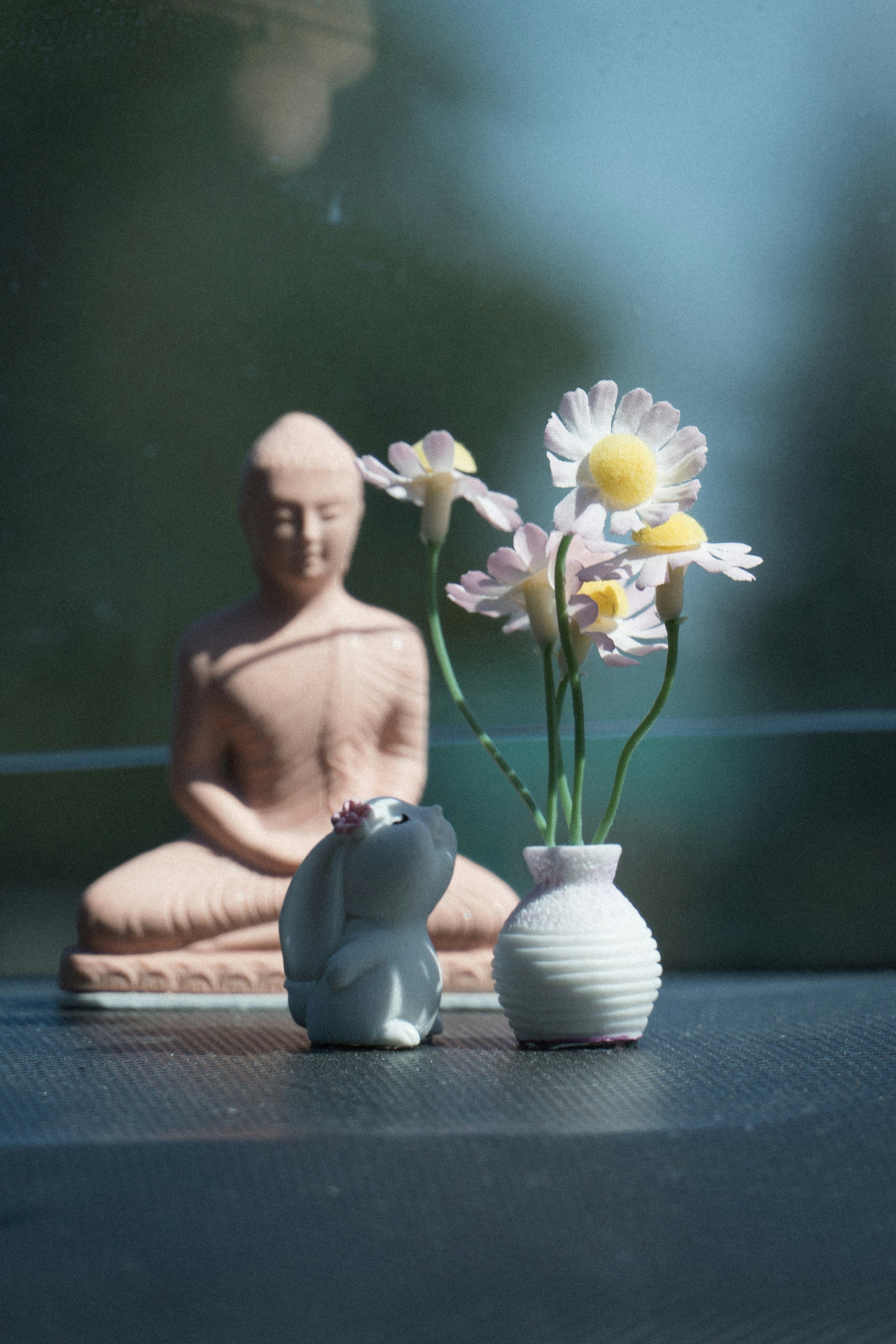 Floral Reverie beside a Quiet Buddha