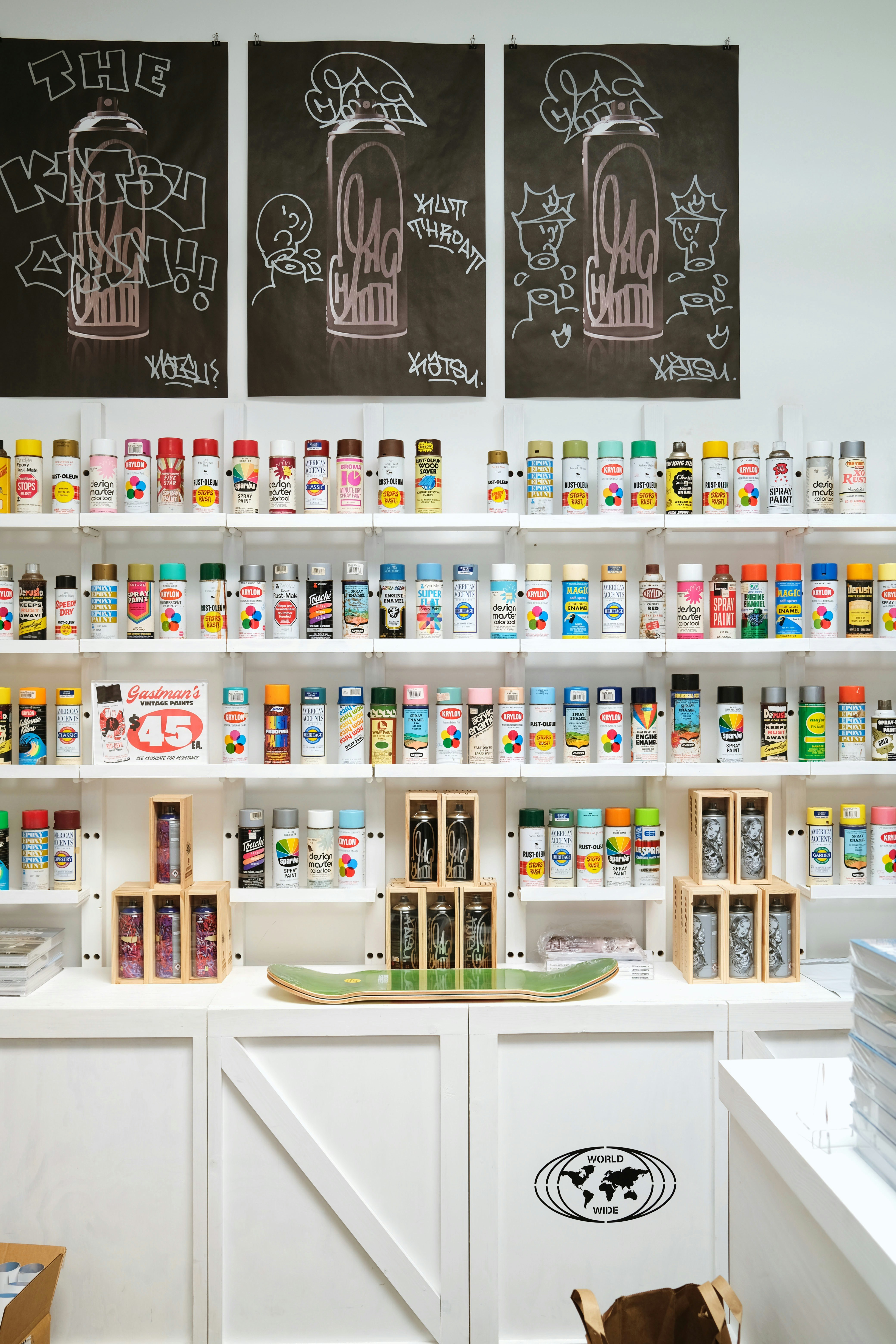 Spray paint cans are neatly organized on shelves. photo – Free Abstract ...