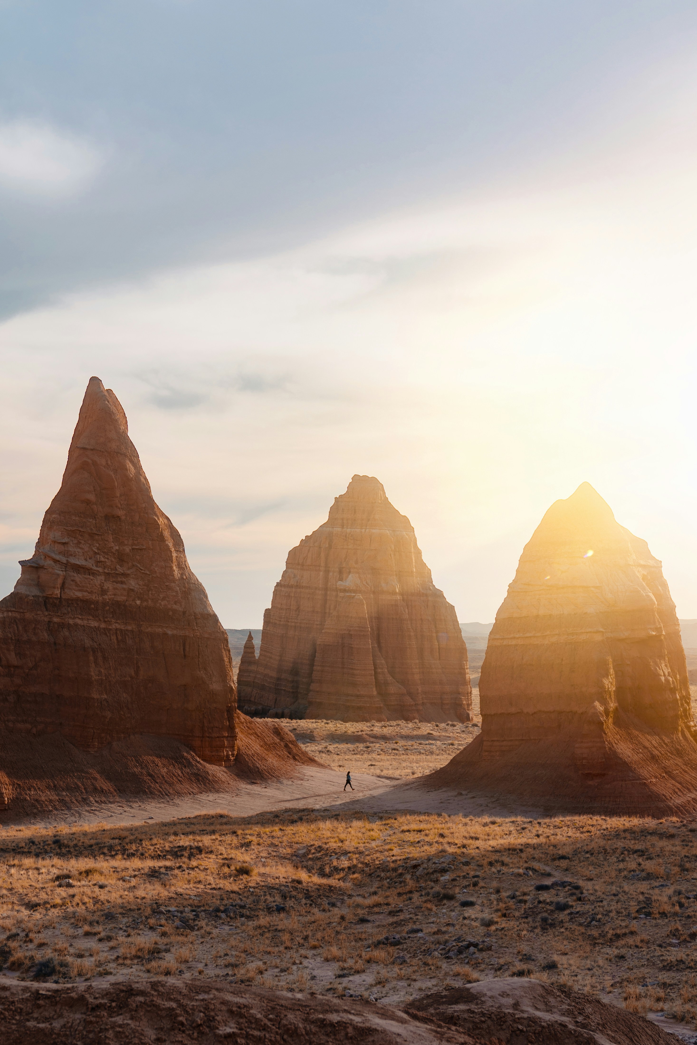 Three rock formations glow at sunset. photo – Free Wallpaper Image on ...