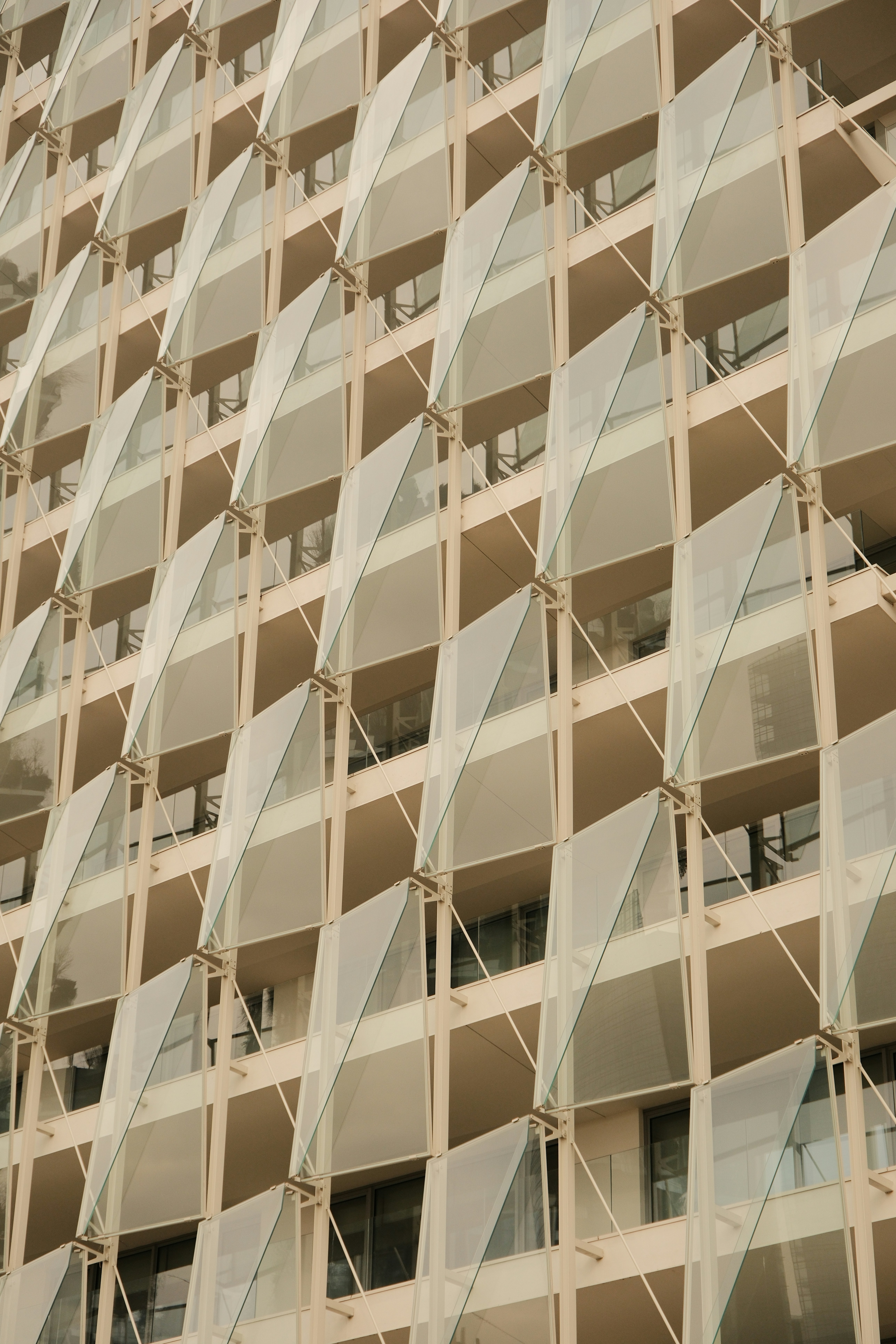 Building facade with a geometric glass design. photo – Free Milano ...