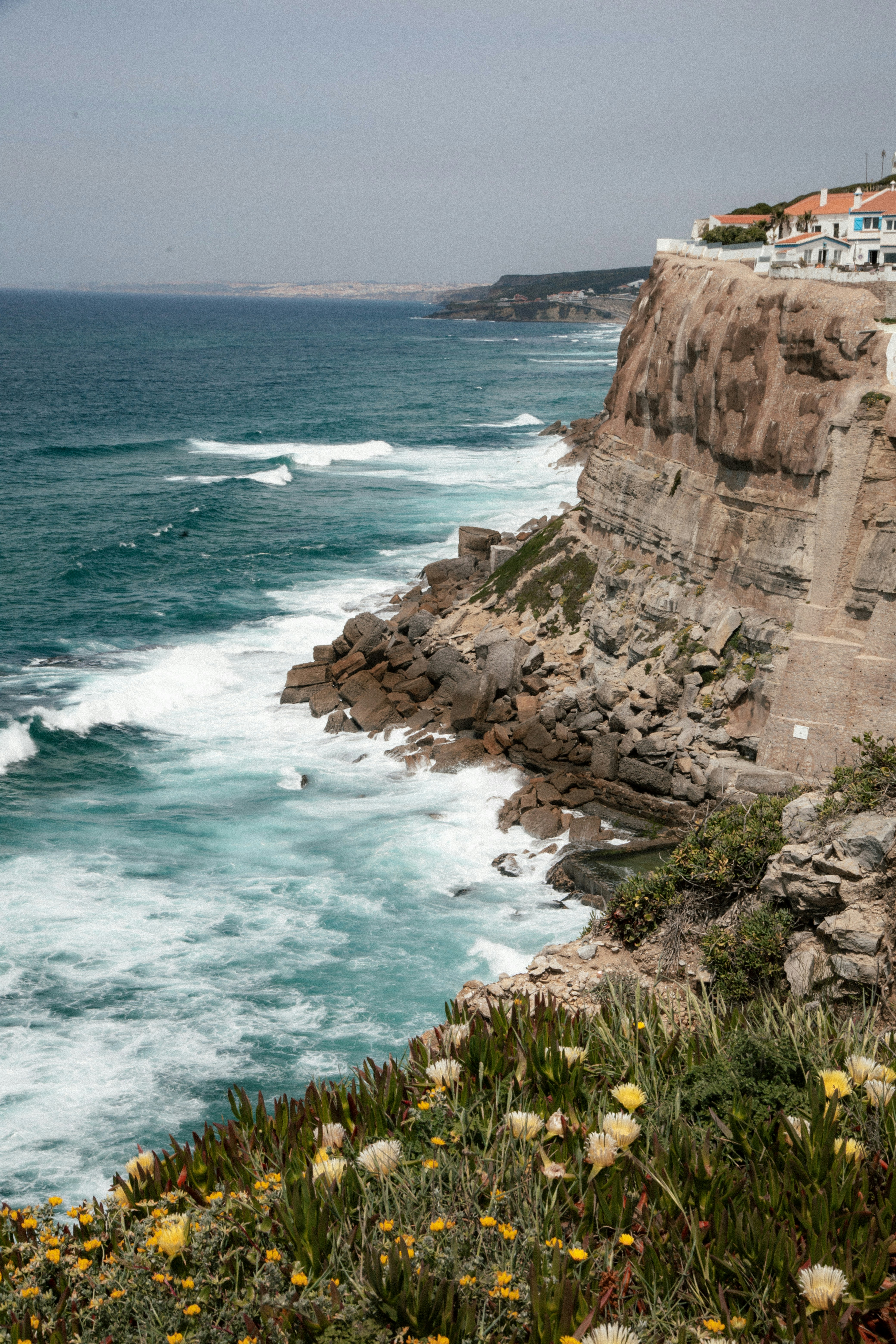 Terraced Cliffside Village Over Turquoise Atlantic