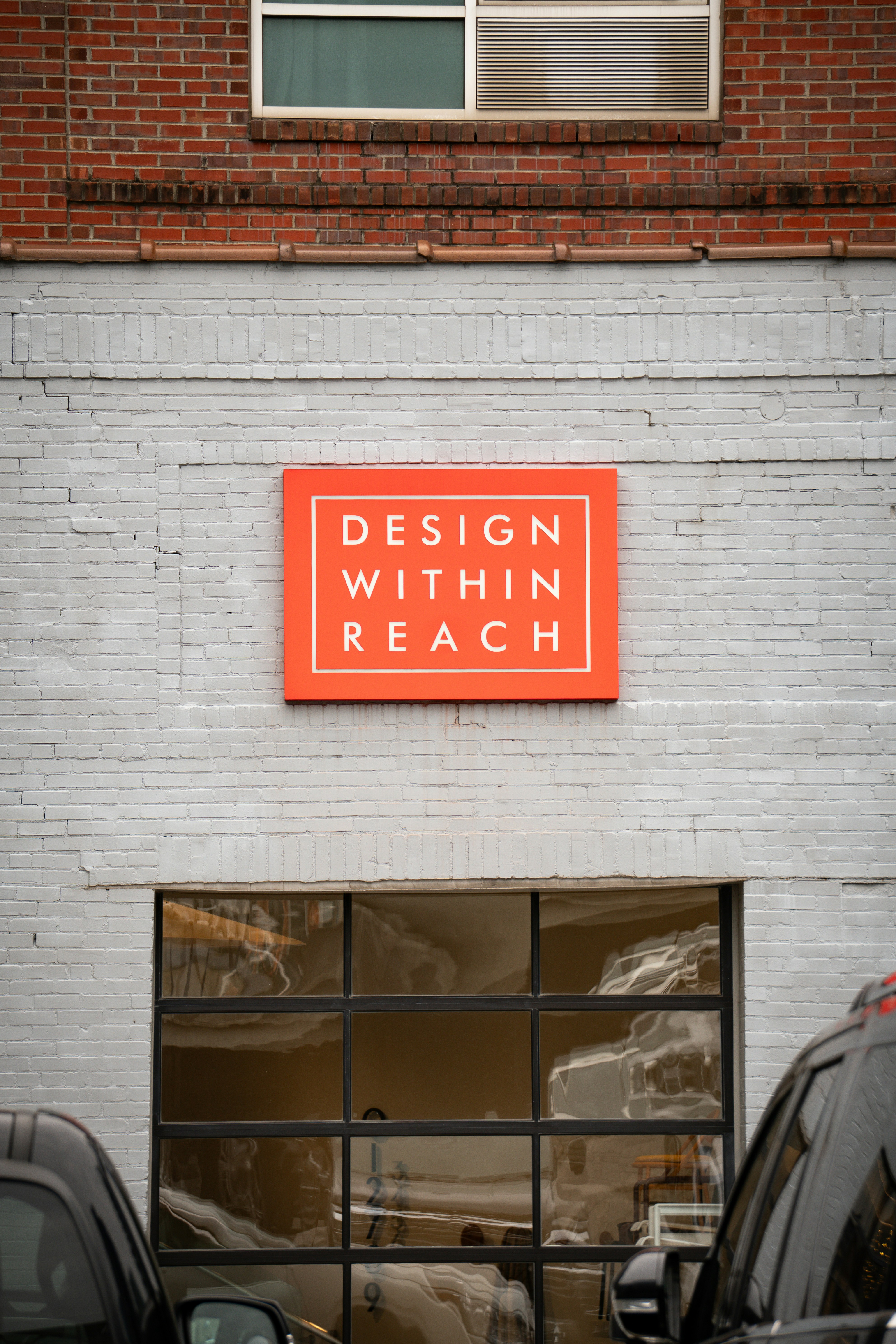 Design within reach sign on a building facade. photo – Free Car Image ...
