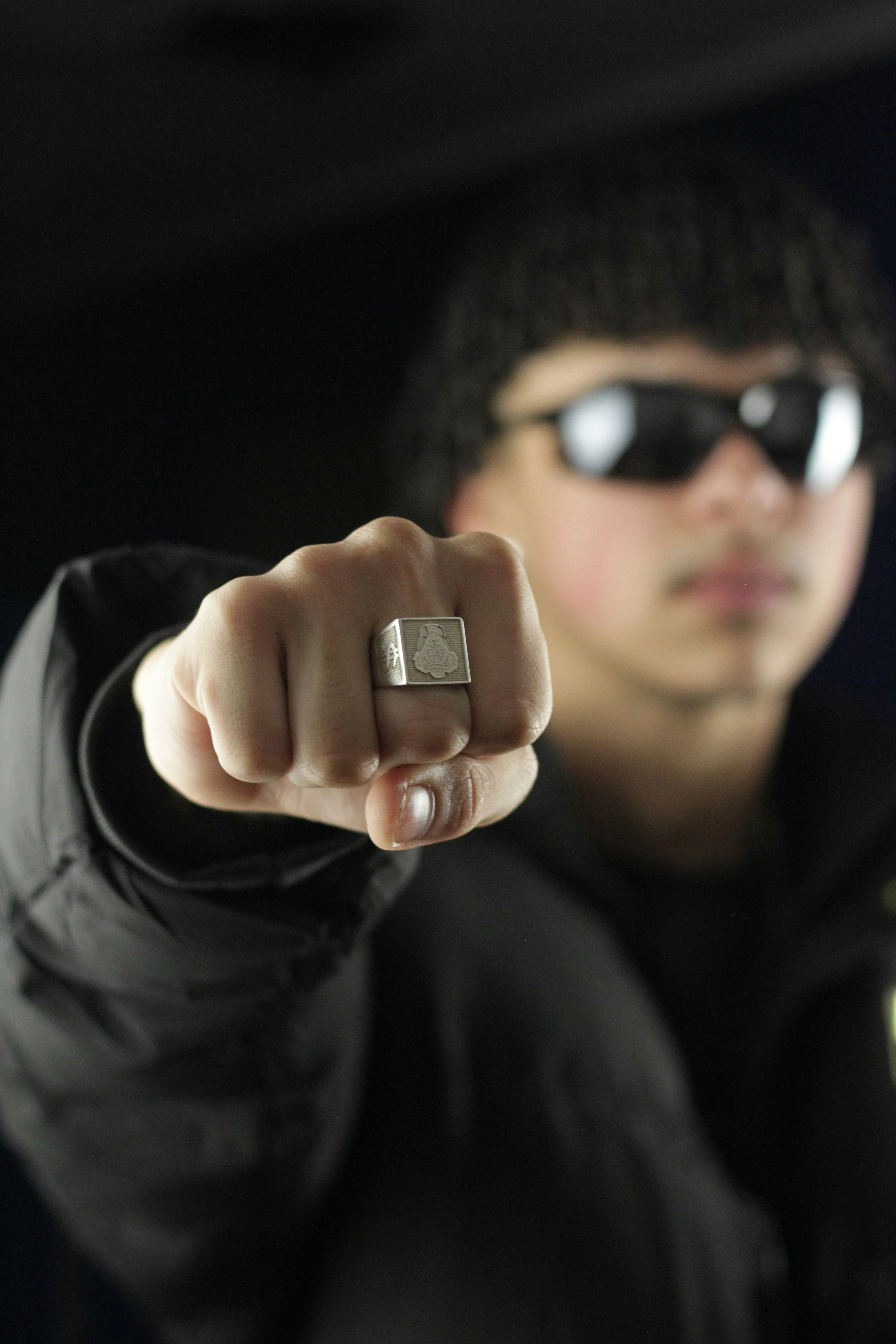Fist Forward: A Quiet Challenge in Dark Studio