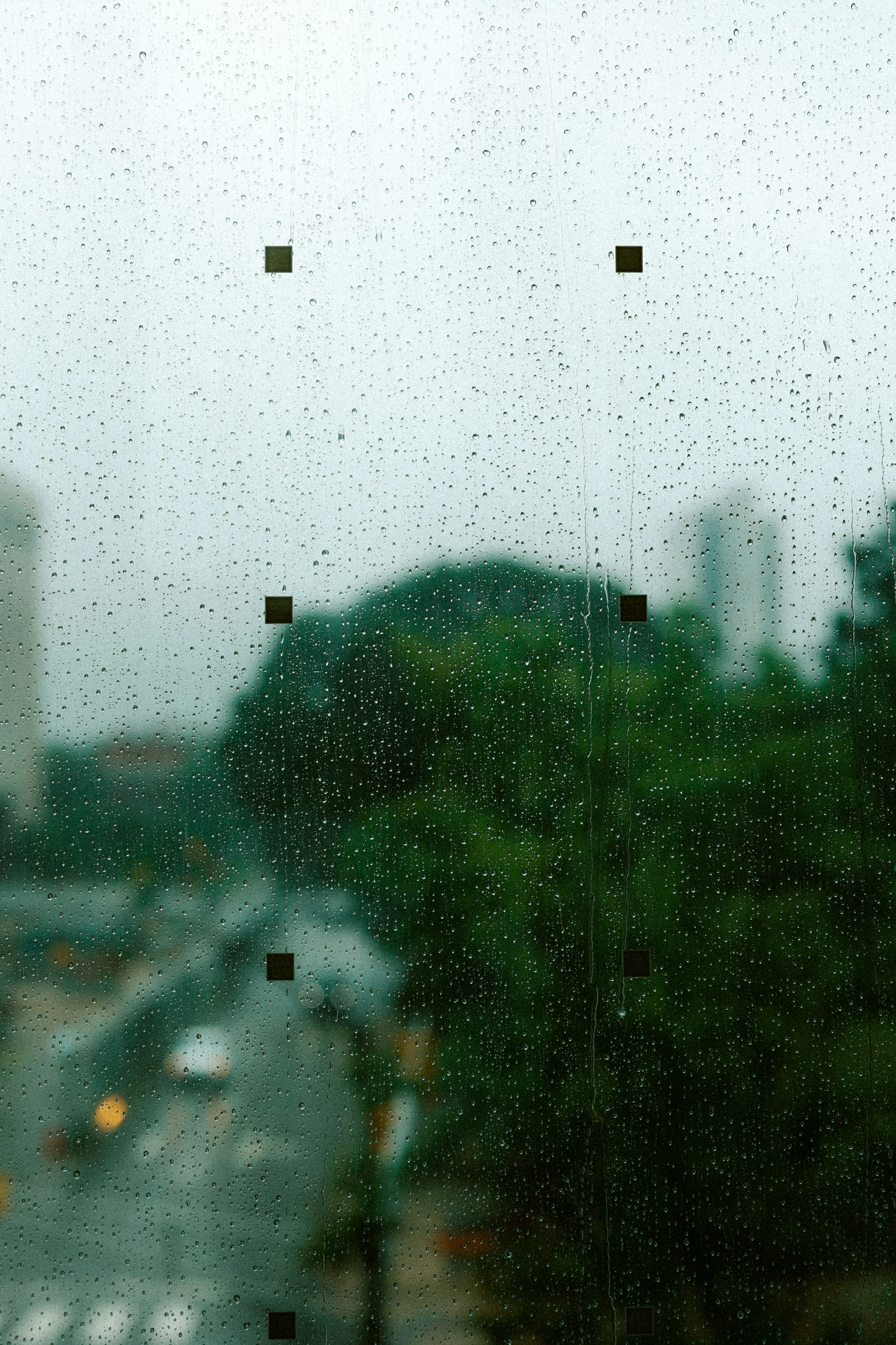 Raindrops blur the outside view through a window. photo – Free City ...