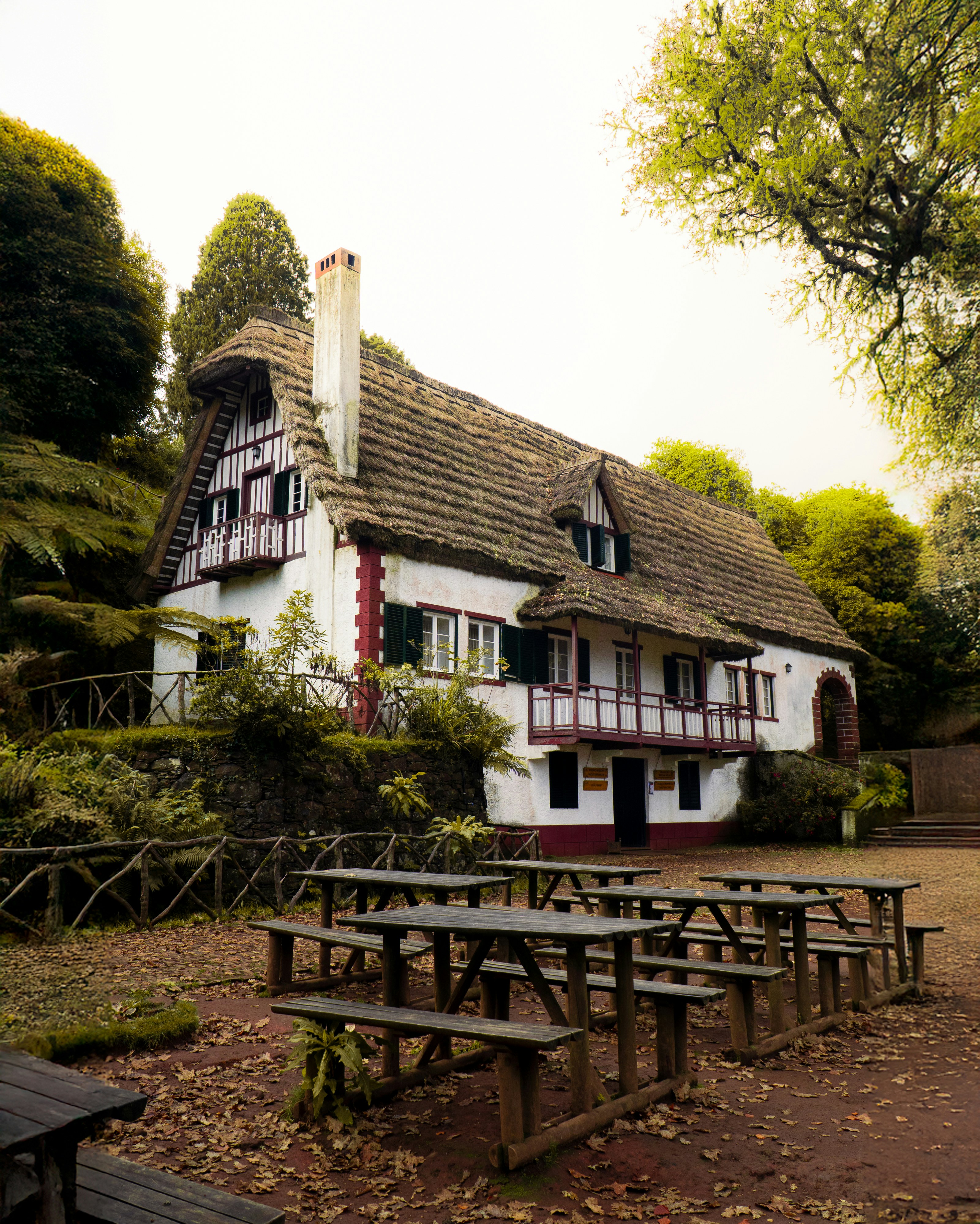 A cozy house with picnic tables in a park. photo – Free Wallpaper Image ...
