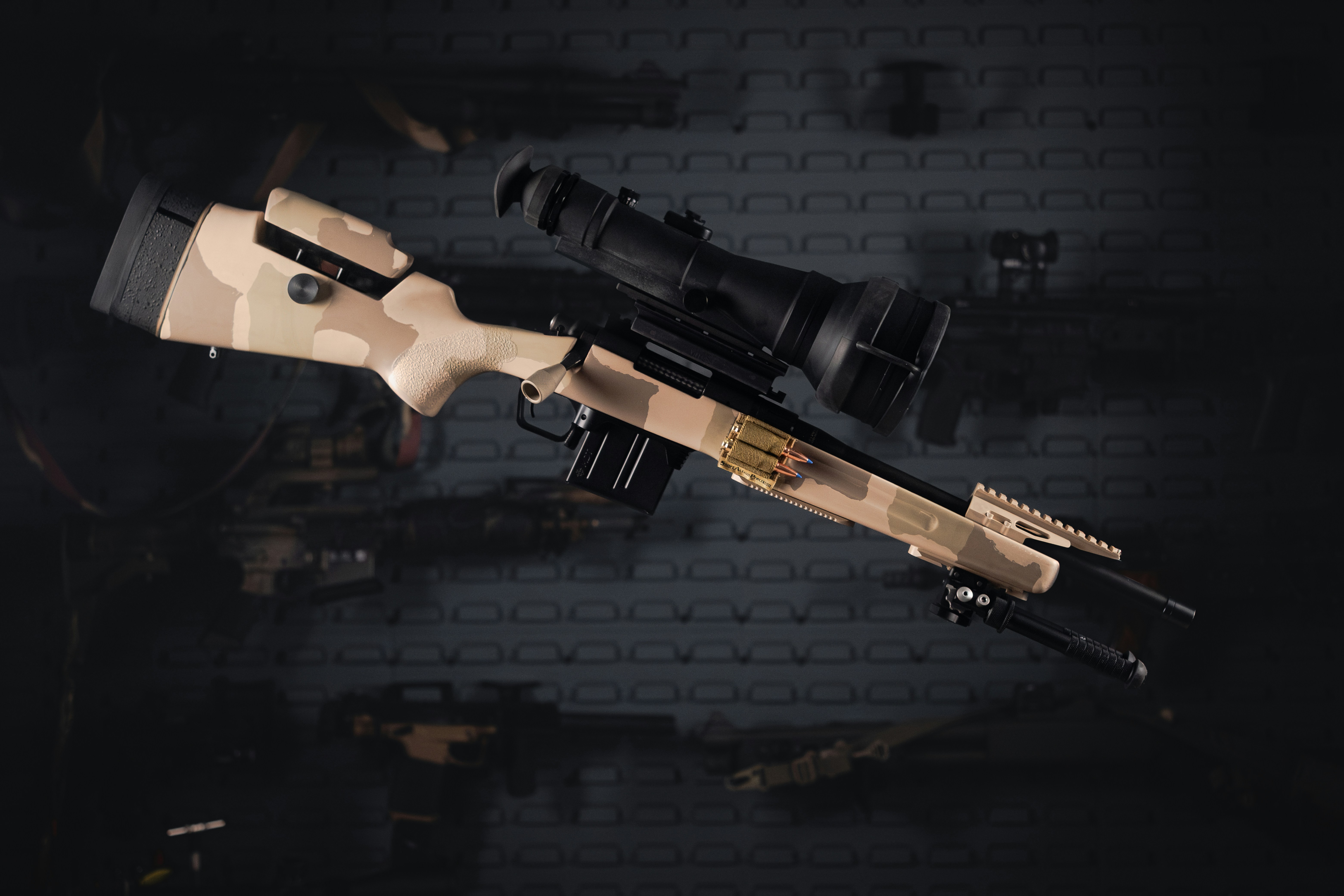 A camouflaged sniper rifle with scope. photo – Free Gun Image on Unsplash
