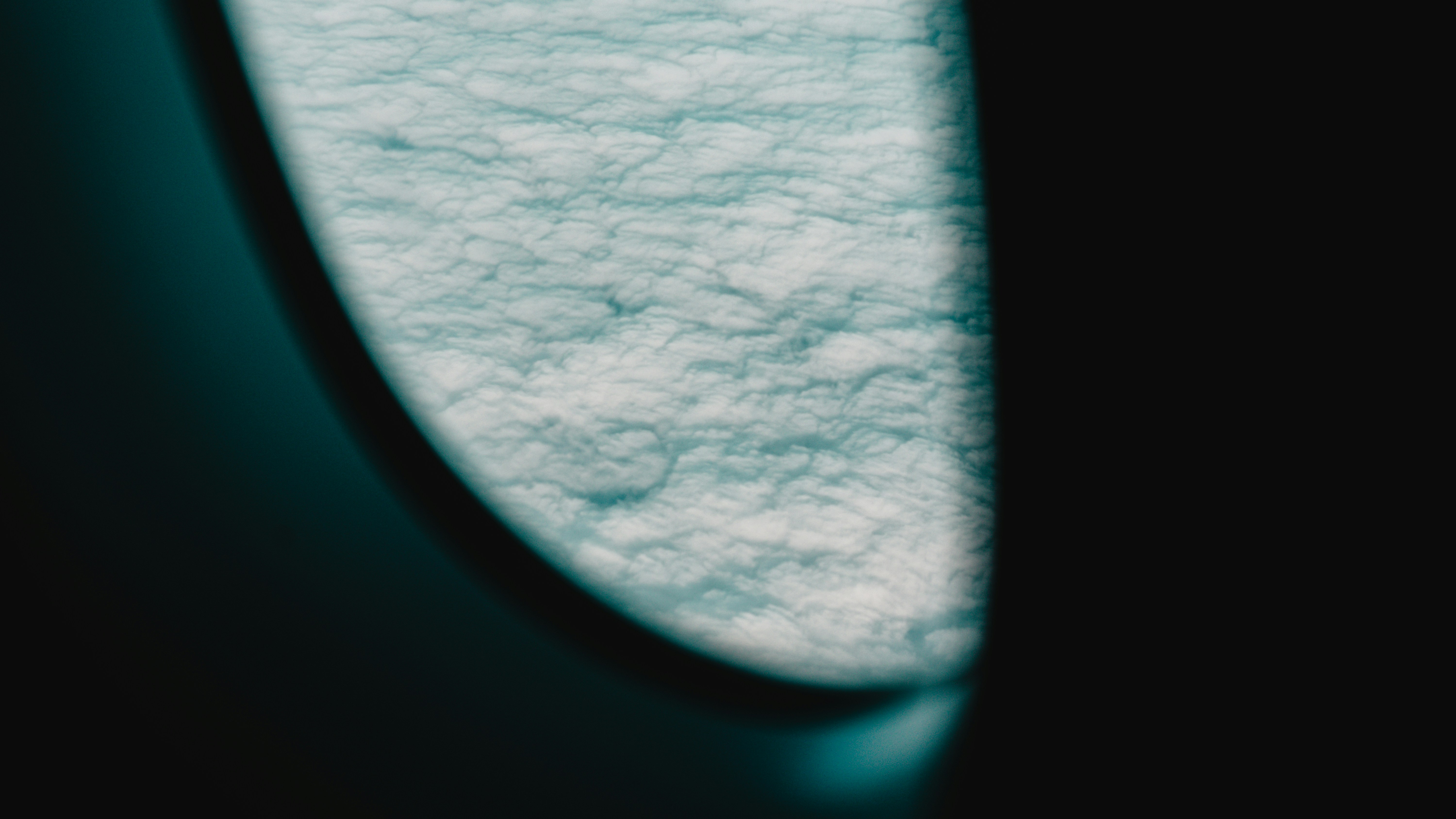 Teal Sky at the Window Arc: Close-Up of Cloud Texture