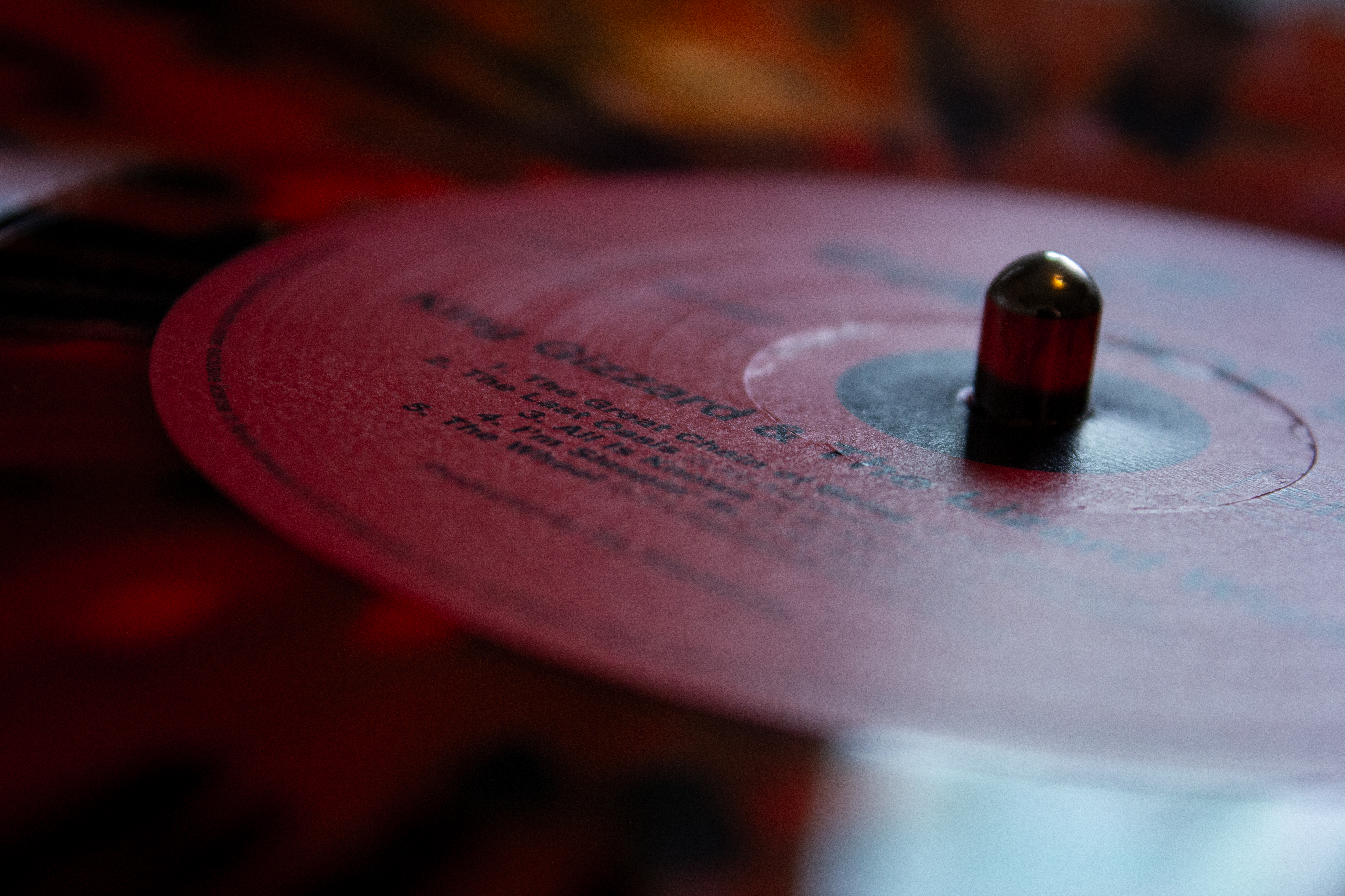 A vinyl record spinning on a turntable.