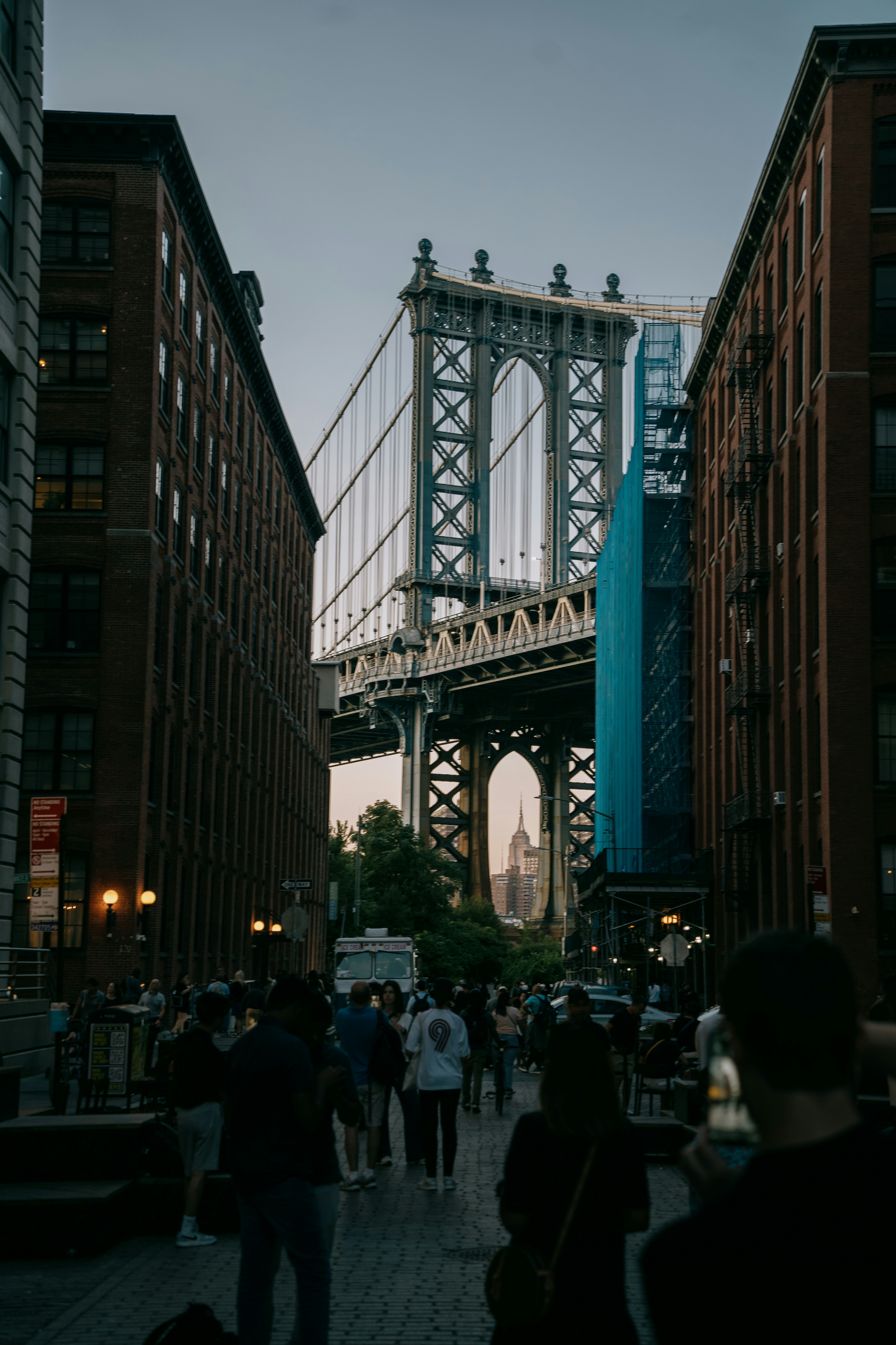 Under the Steel Arc: A Gritty City Walk Toward the Manhattan Bridge