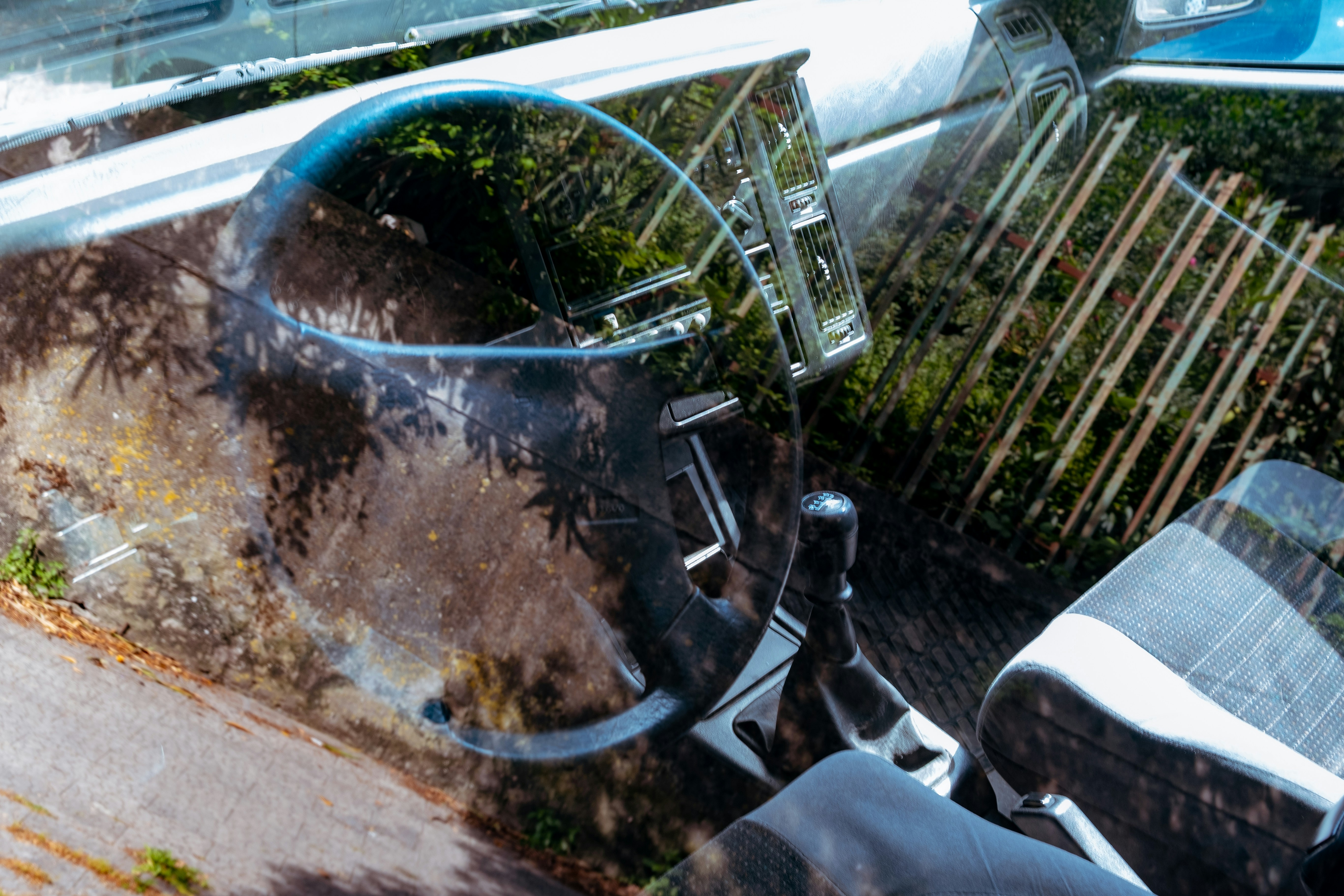 Mirror of chrome and shadows: a downshifted cabin of reflections