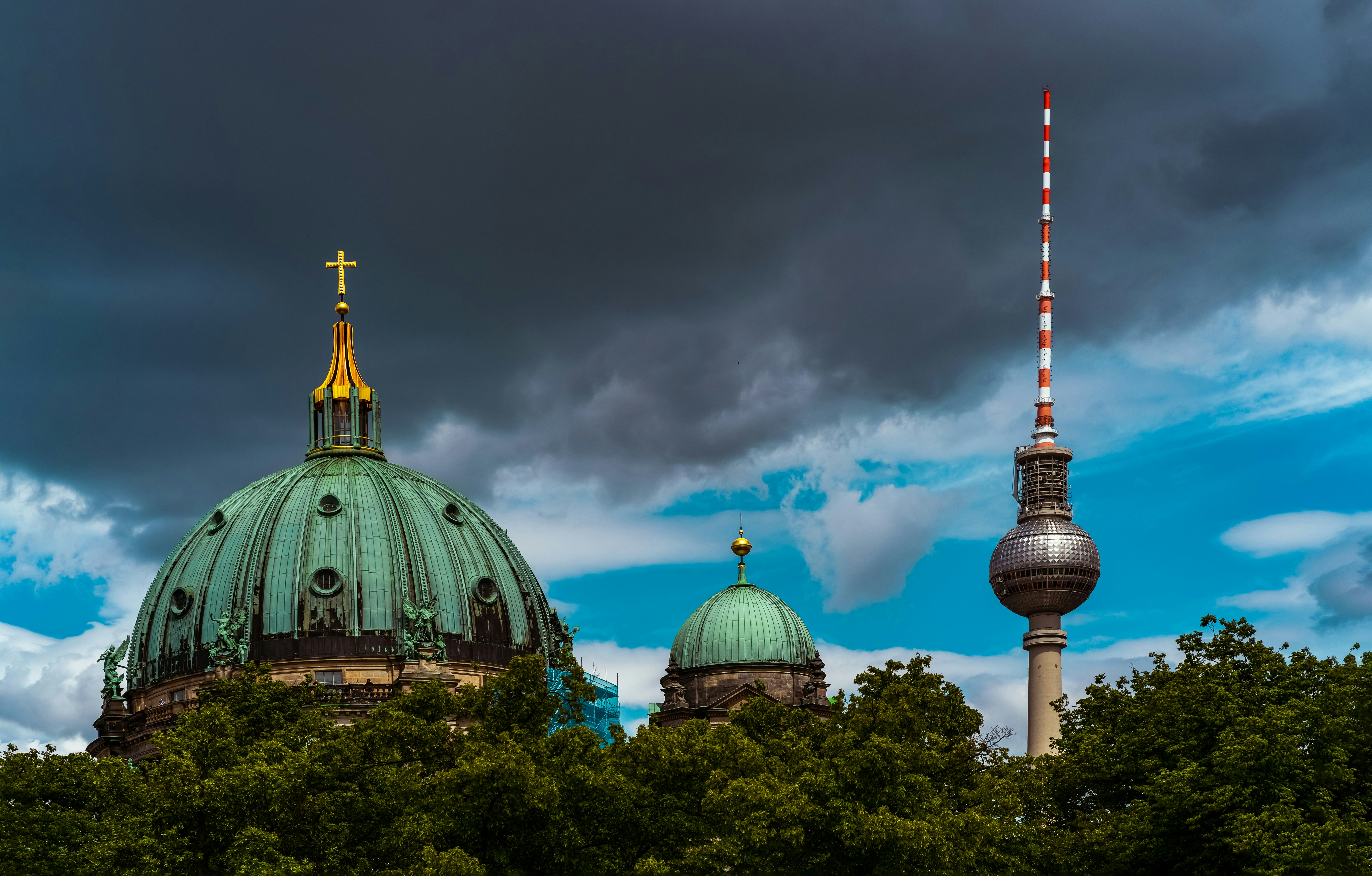 Berlin's Green Dome Meets the Fernsehturm: A Stormy Skyline Portrait