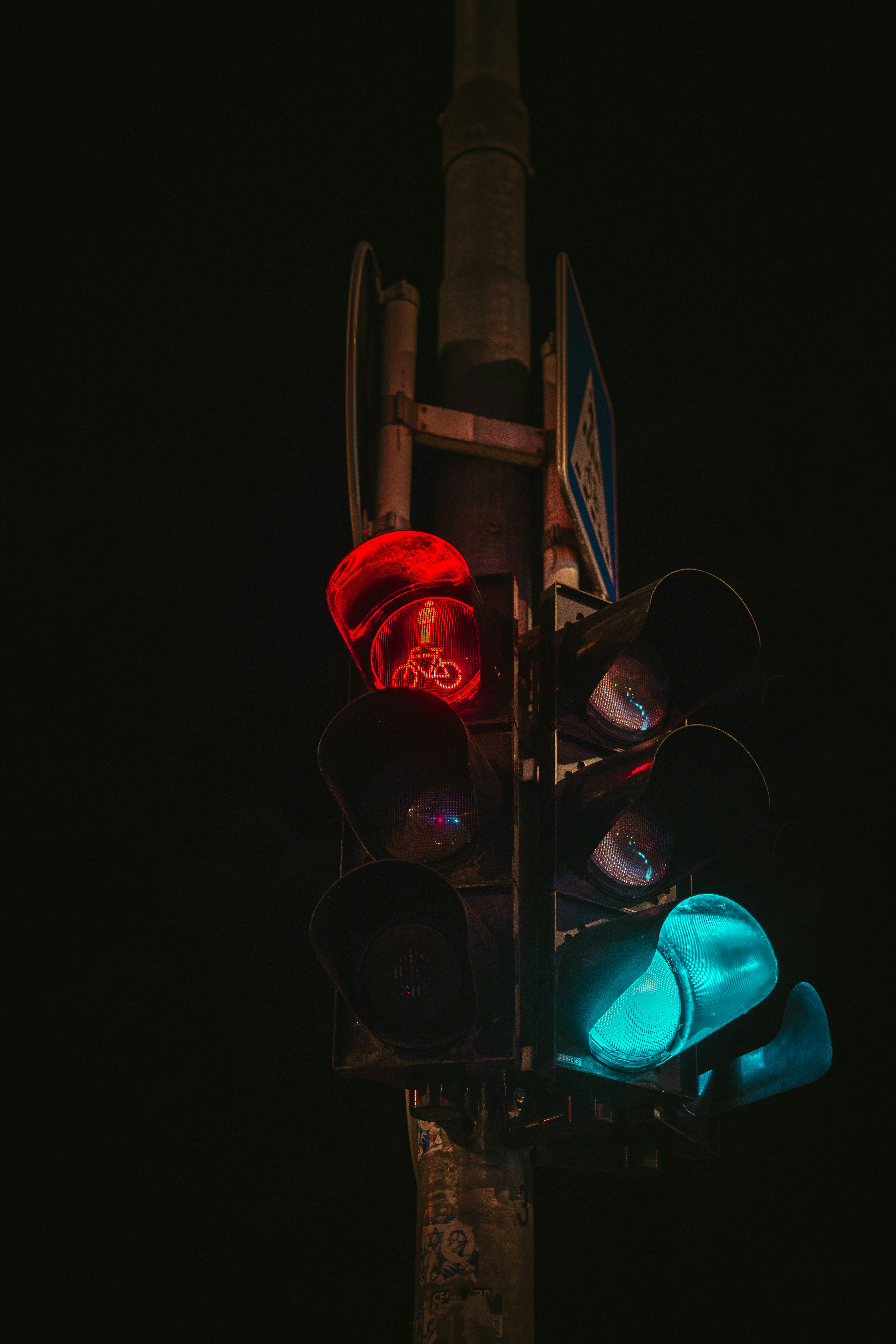 Teal Pulse and Red Icon: A Night Signal Portrait