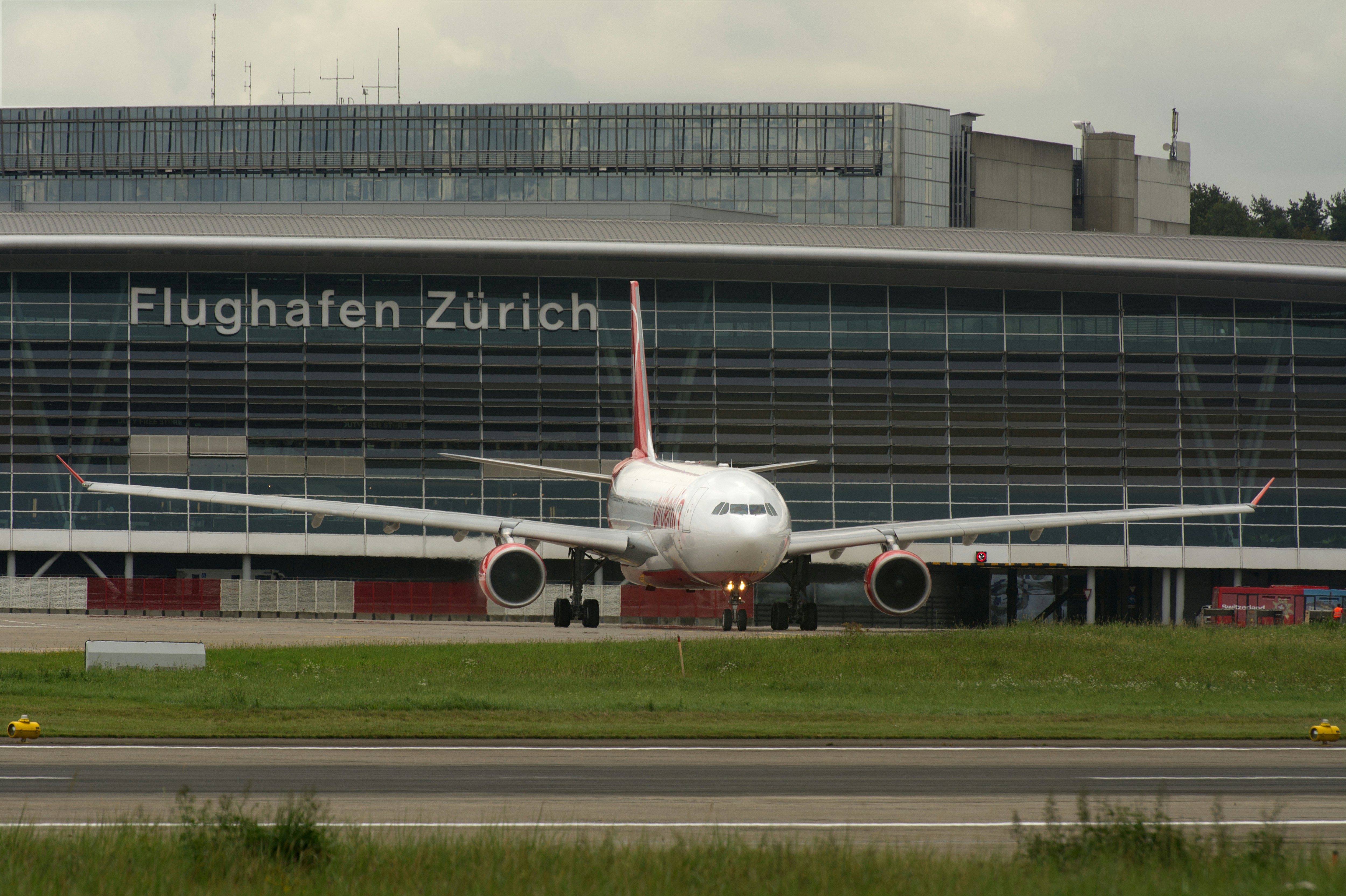 Zurich Gateframe: Front-On Jet Framed by the Glass Terminal