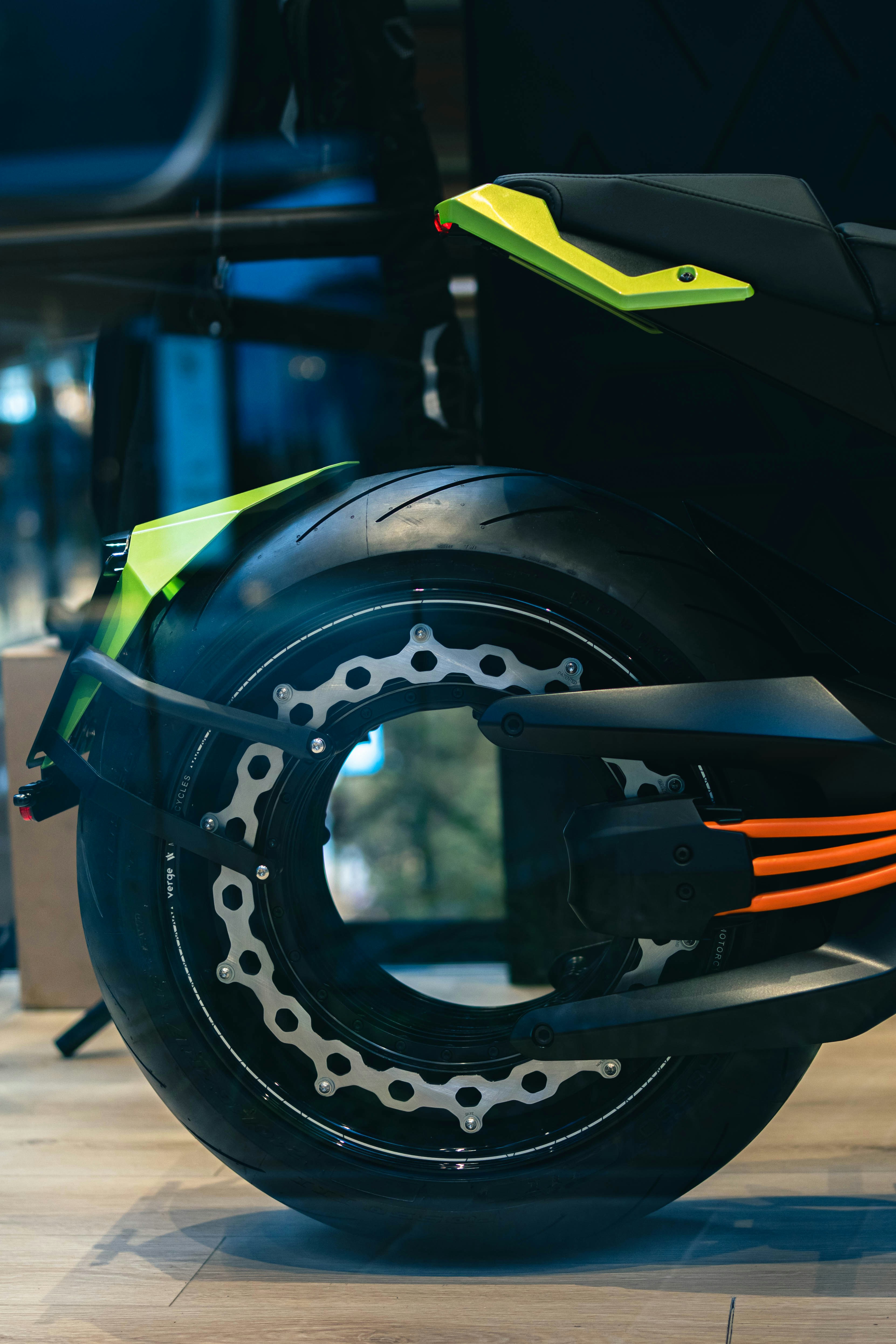 Close-up of a futuristic electric motorcycle wheel.