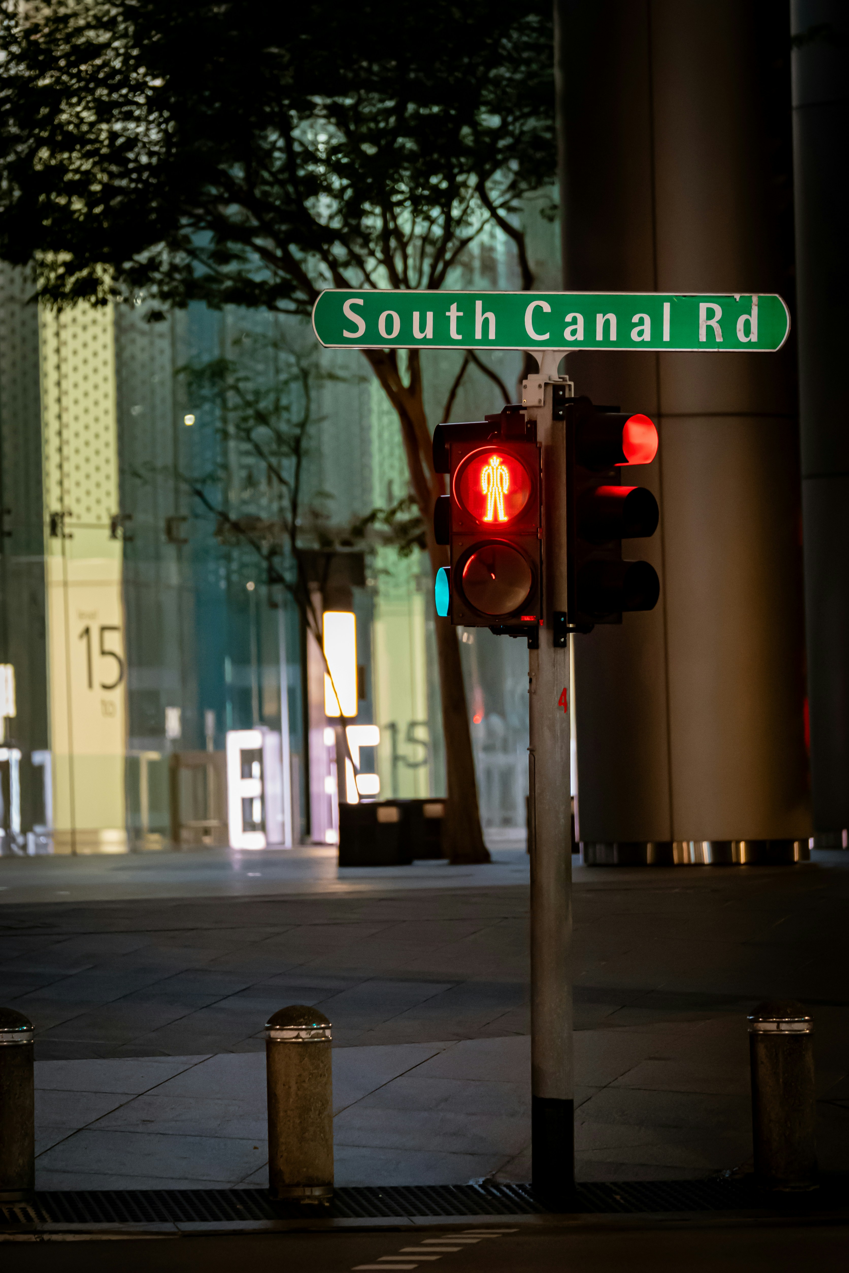 The crosswalk light is red, on south canal road.