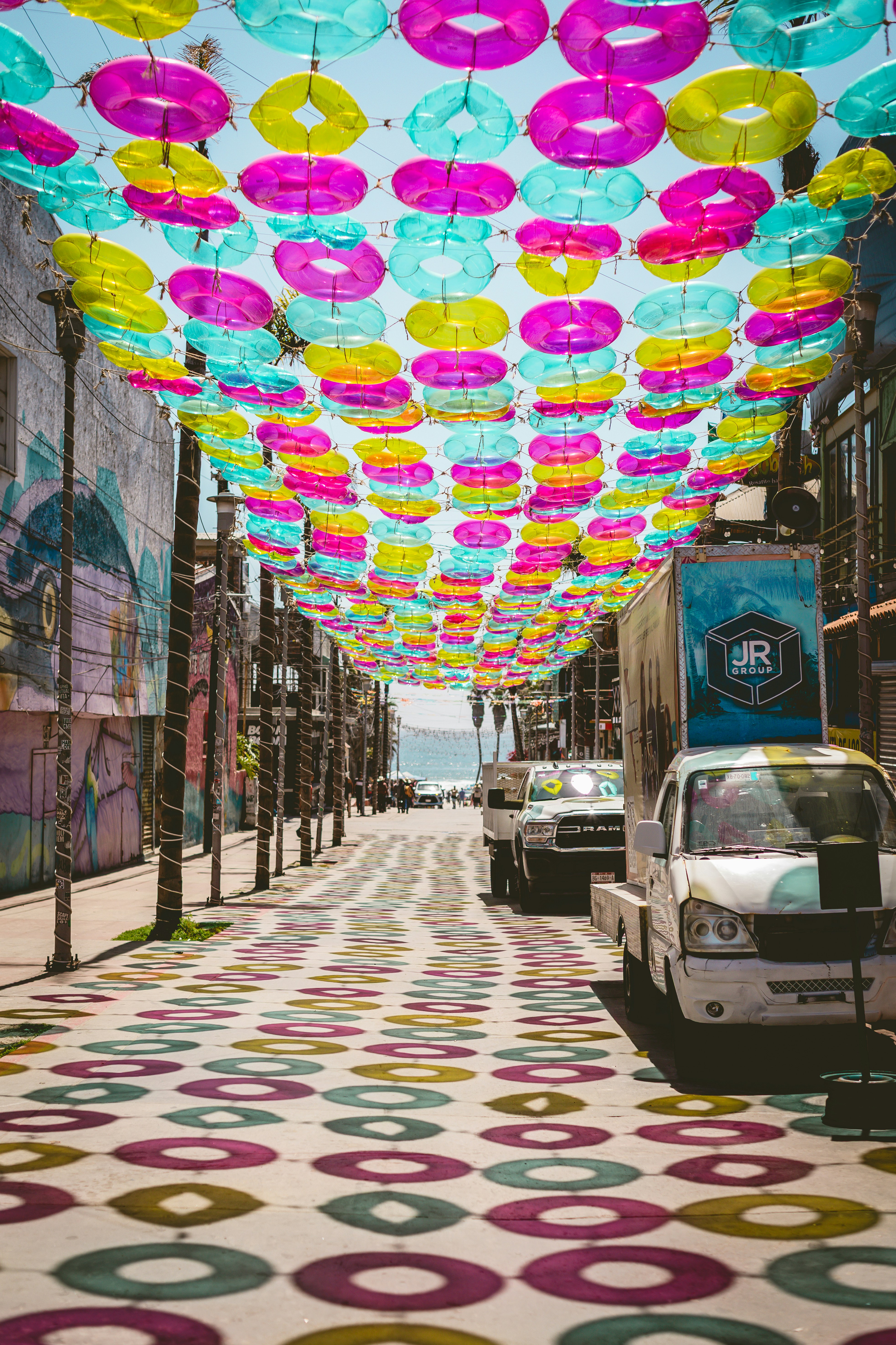 Colorful Lantern Corridor Leads to the Sea