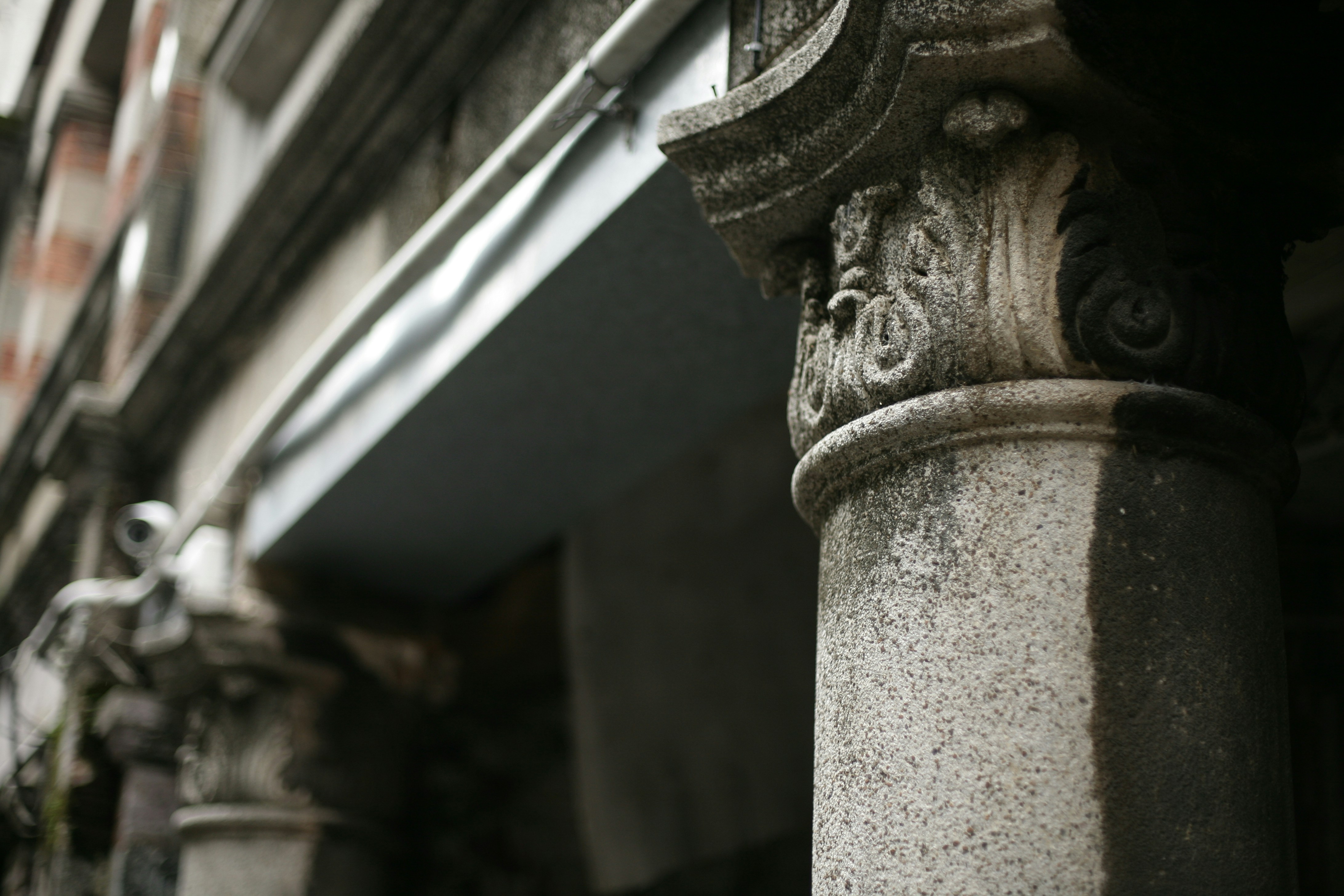 Architectural details of ancient stone pillars are visible. photo ...