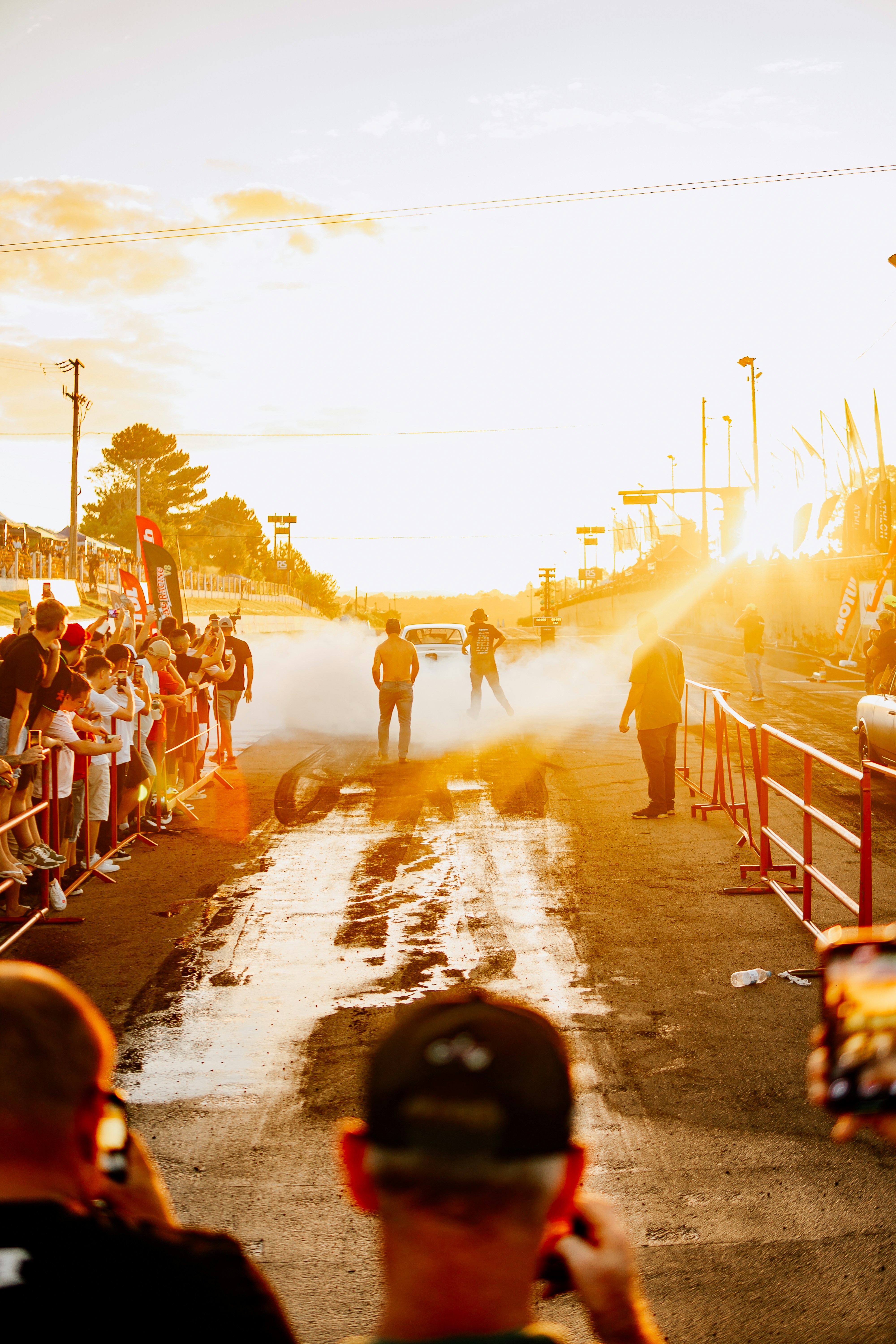 Sunset view of a drag race and its spectators. photo – Free Car Image ...