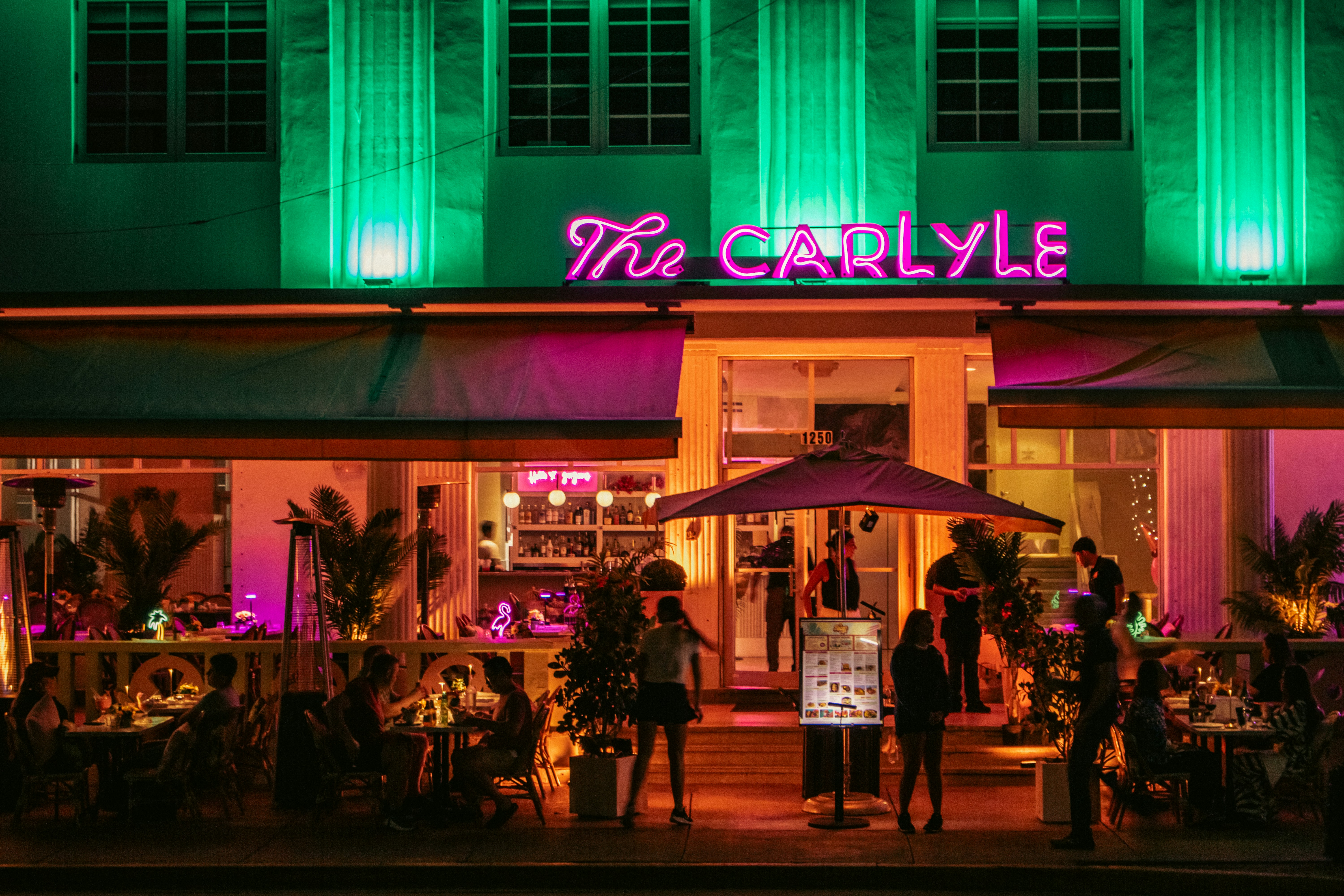 The carlyle restaurant illuminated at night. photo – Free Building ...