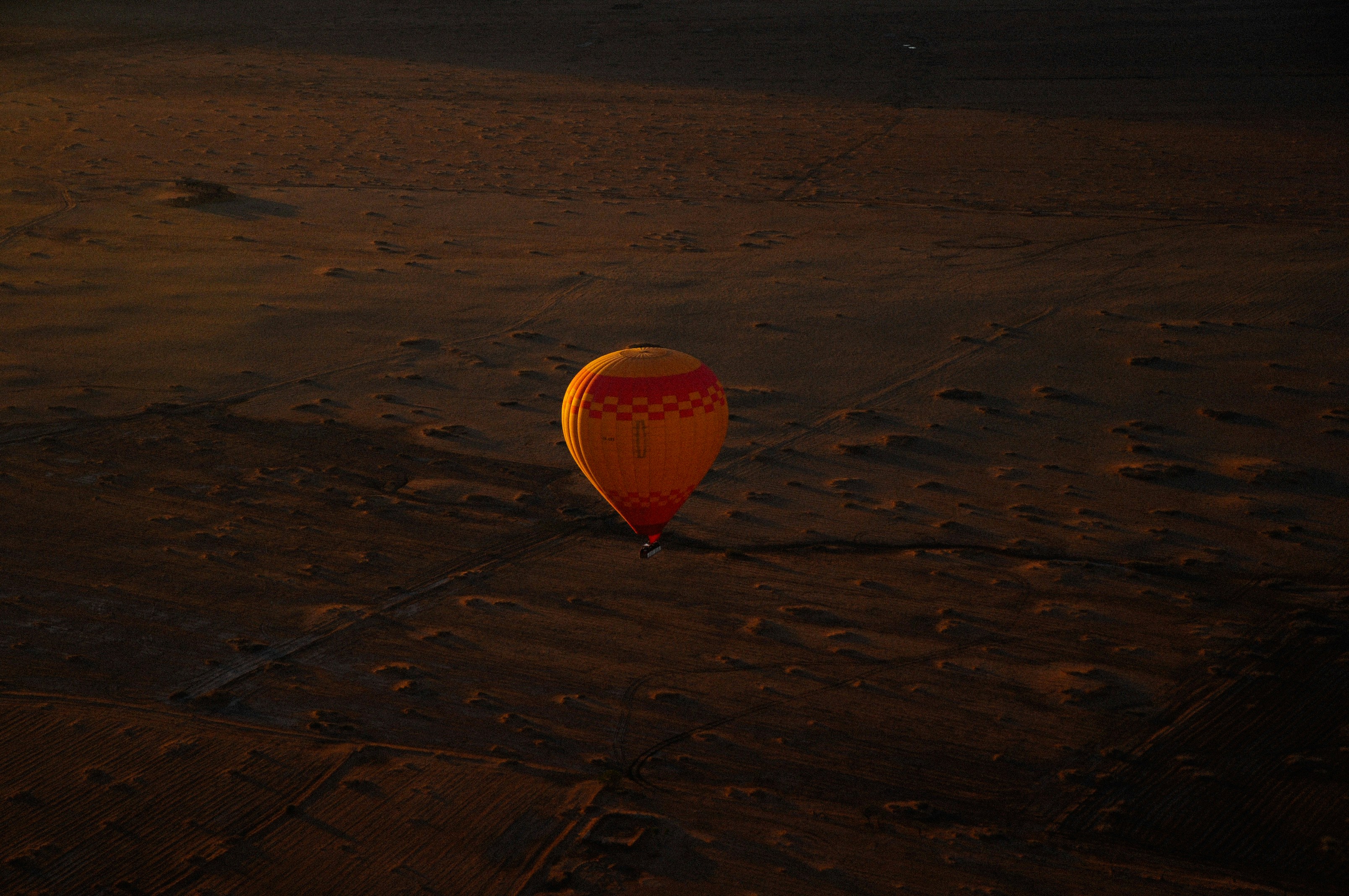 A Solitary Ascent: The Journey of a Hot Air Balloon