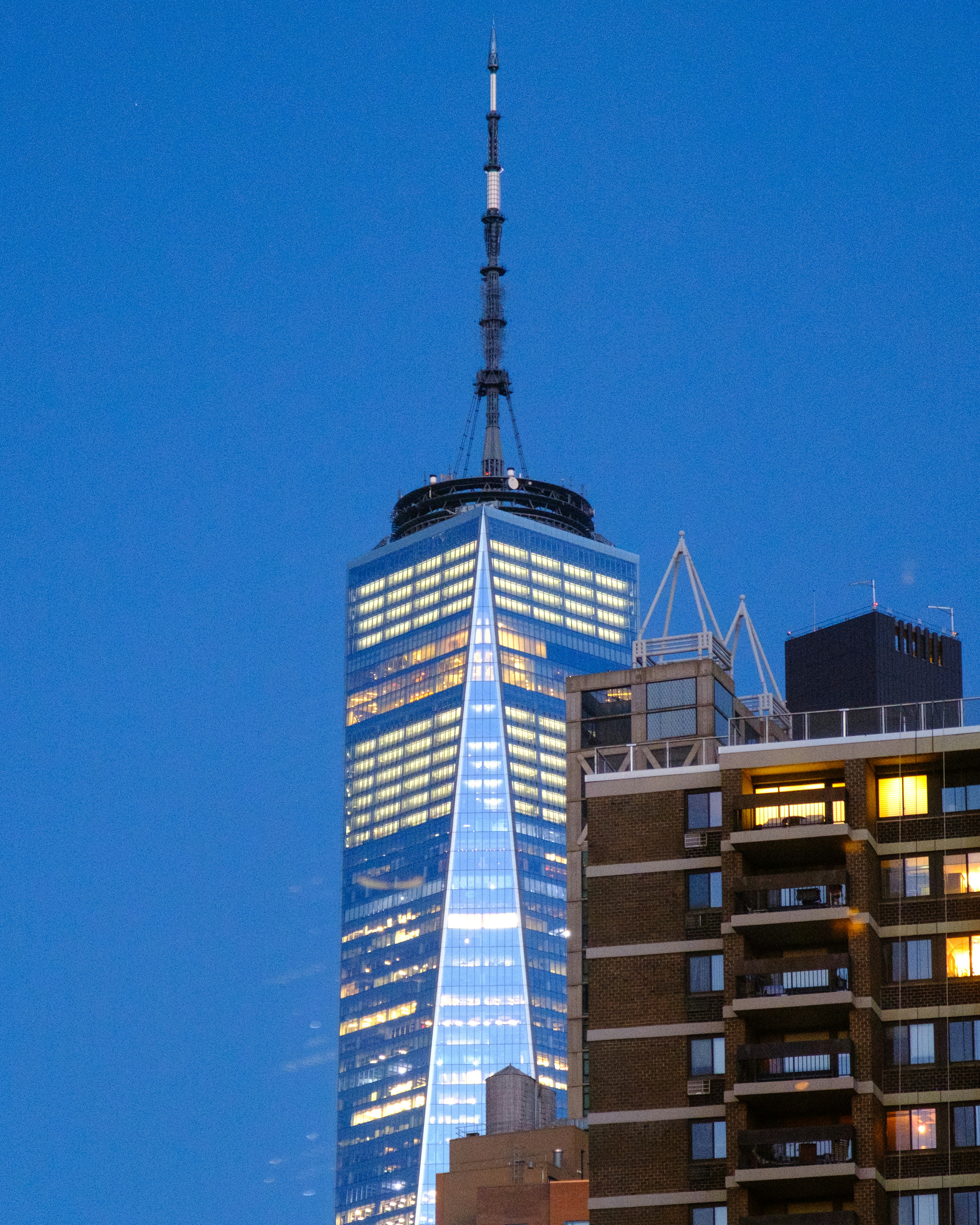 Beacon of Glass: One World Tower Rising Against the Dusk Sky