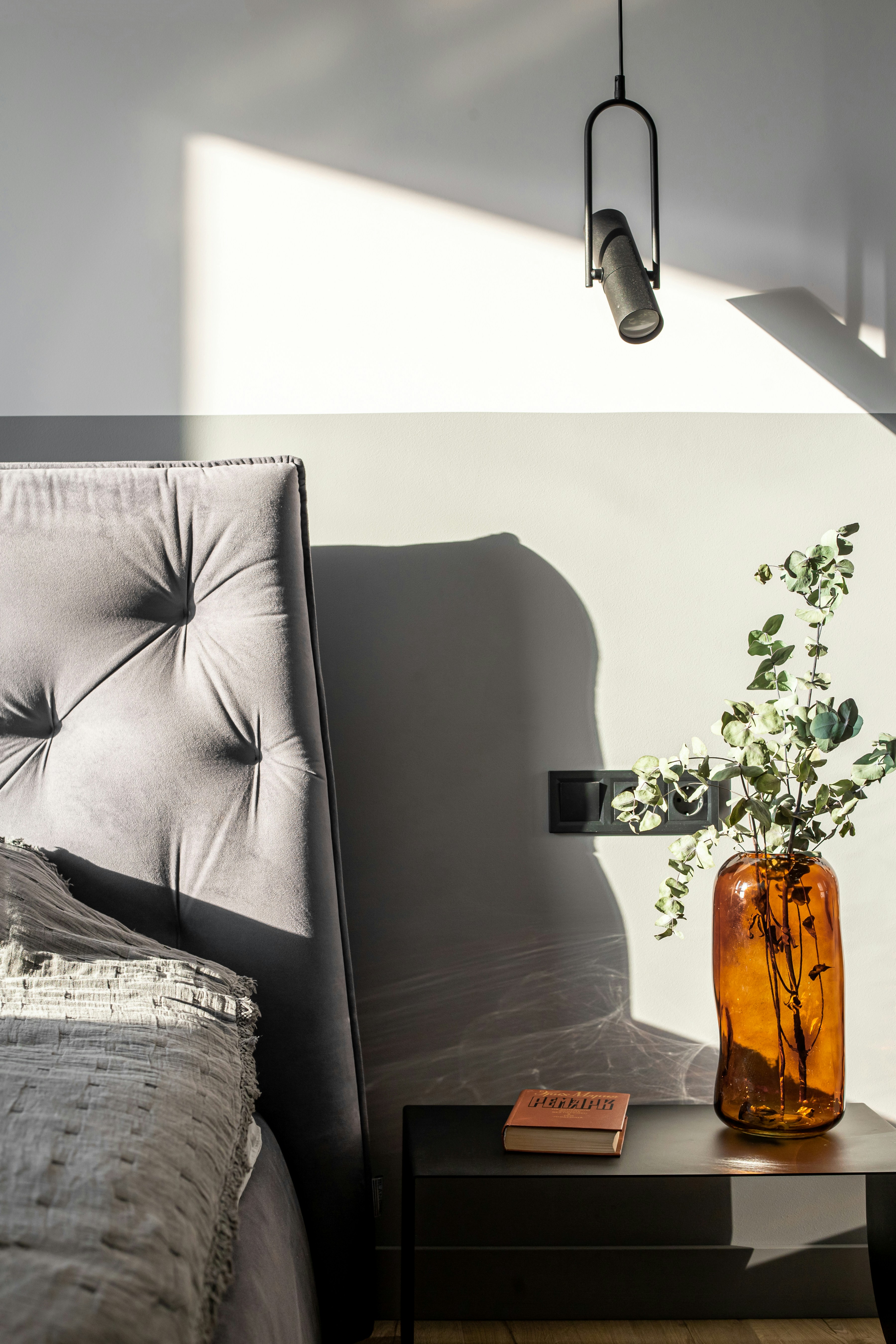 A stylish bedroom with natural light and decor. photo – Free Interior ...