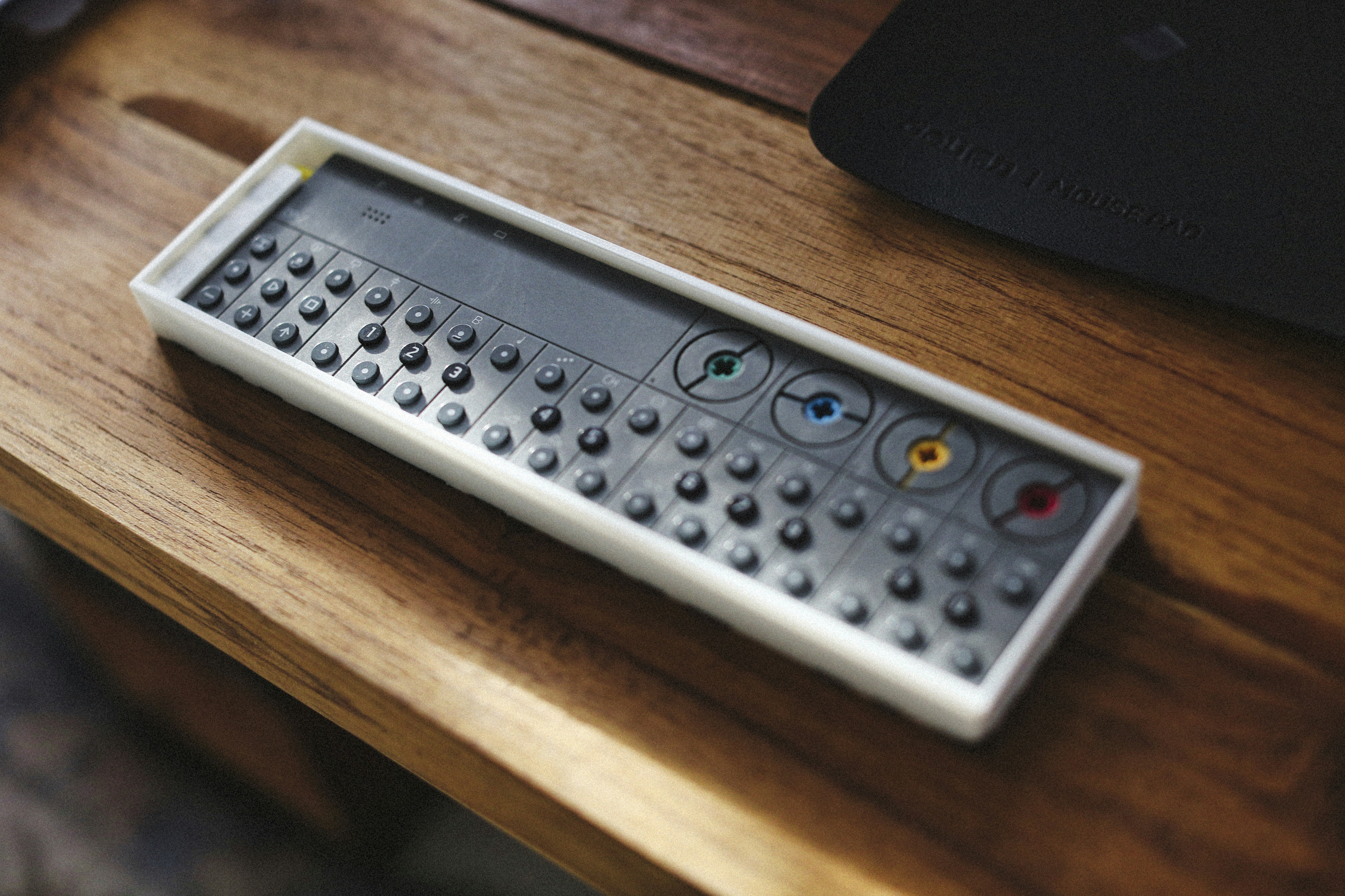 Mini Coded Keys: A Mechanical Keyboard Tray on a Wooden Desk