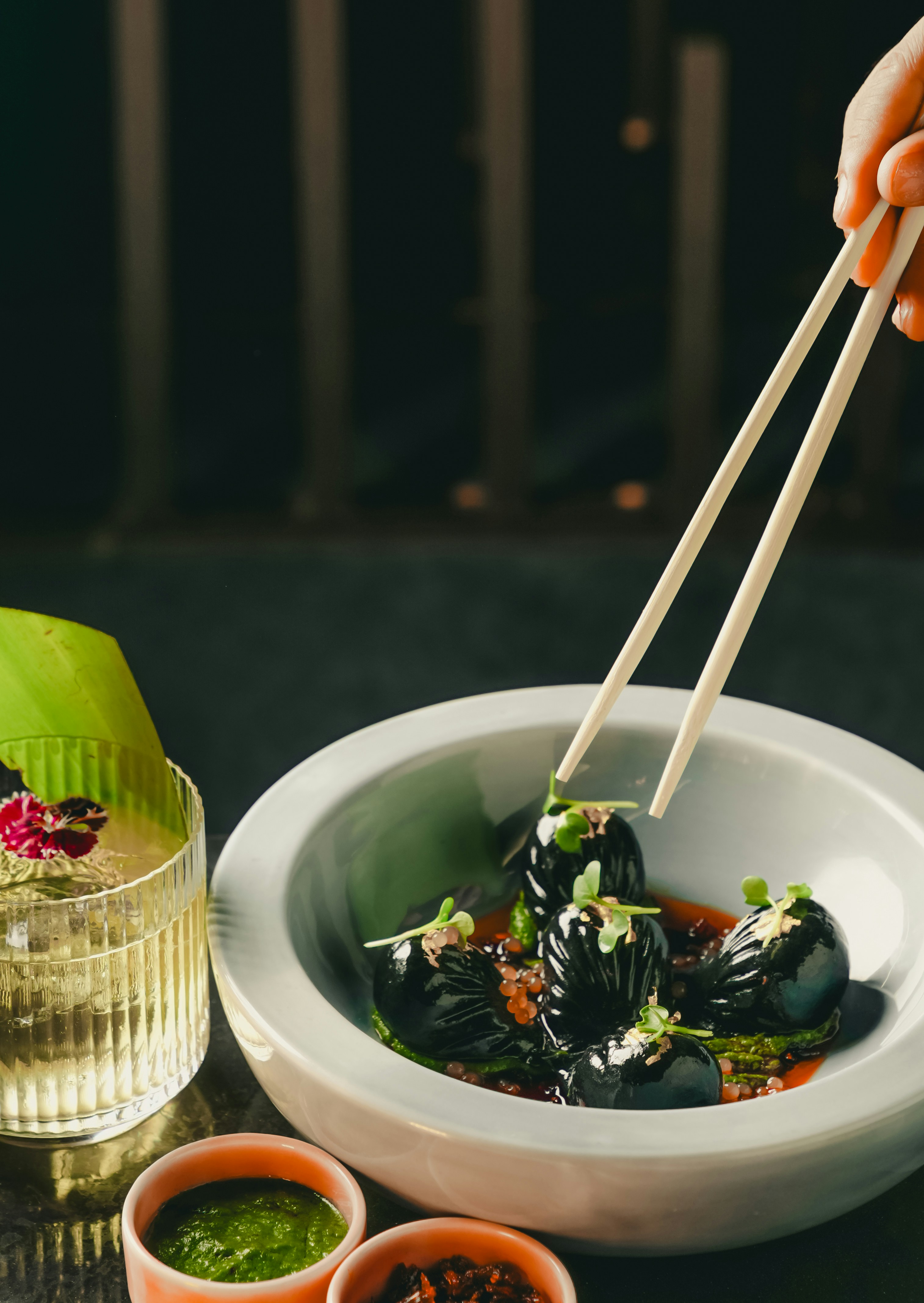 Chicchon of Charred Grape‑Pocco: Velvet-black Dumplings in Fresh Green Splash