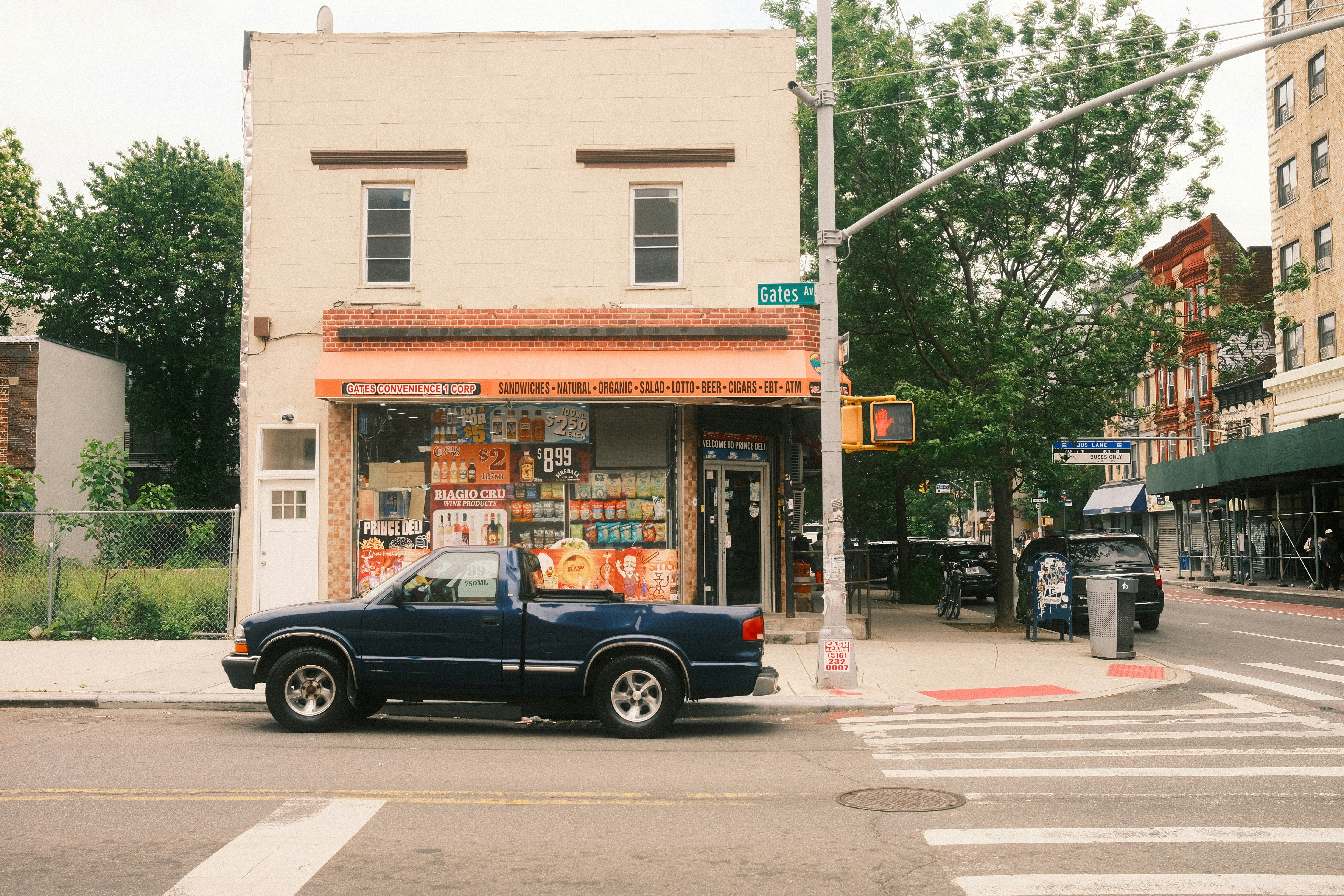 A small storefront with a truck parked out front. photo – Free Street ...