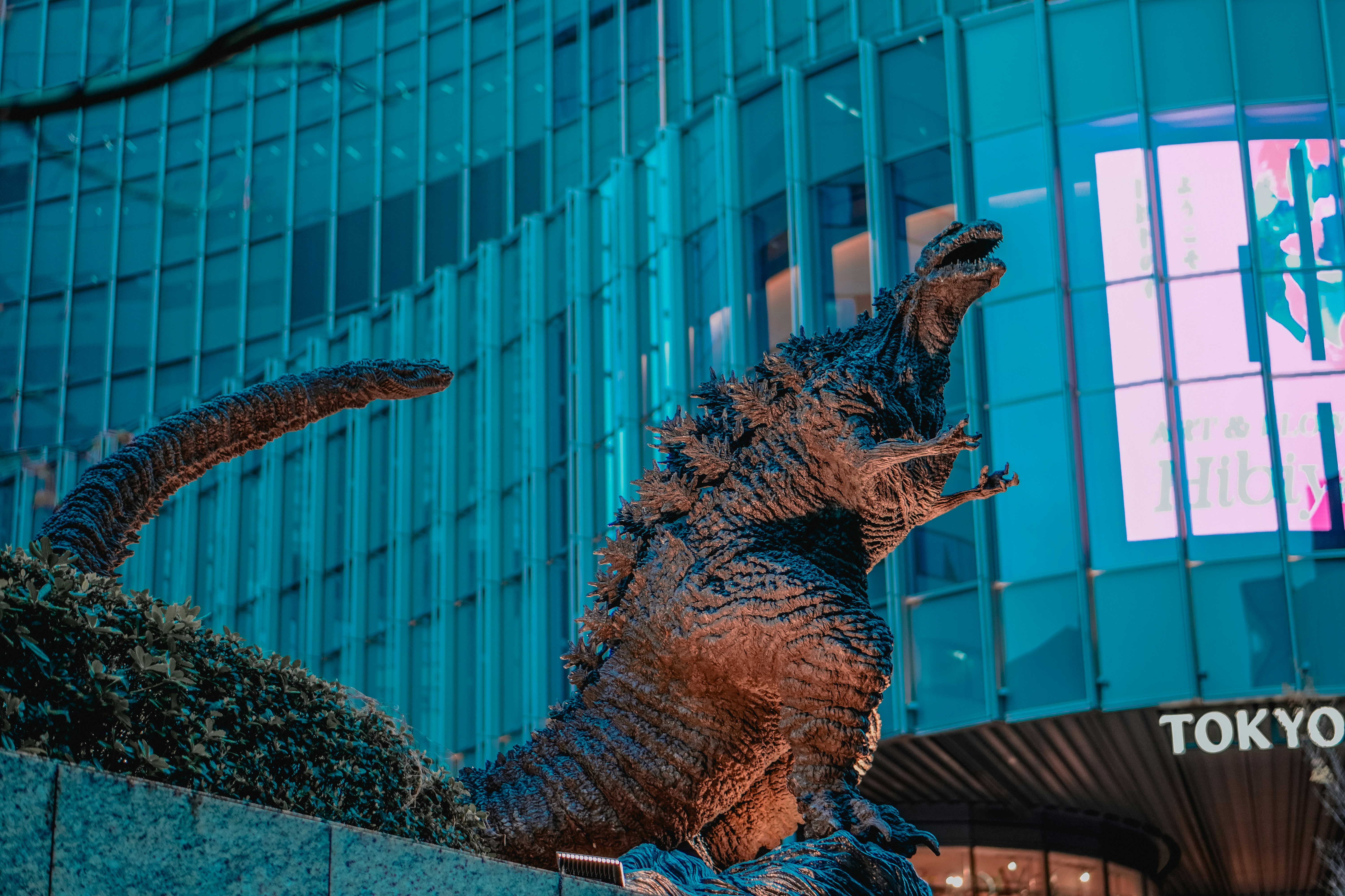 Godzilla statue in front of a building in tokyo. photo – Free Japan ...