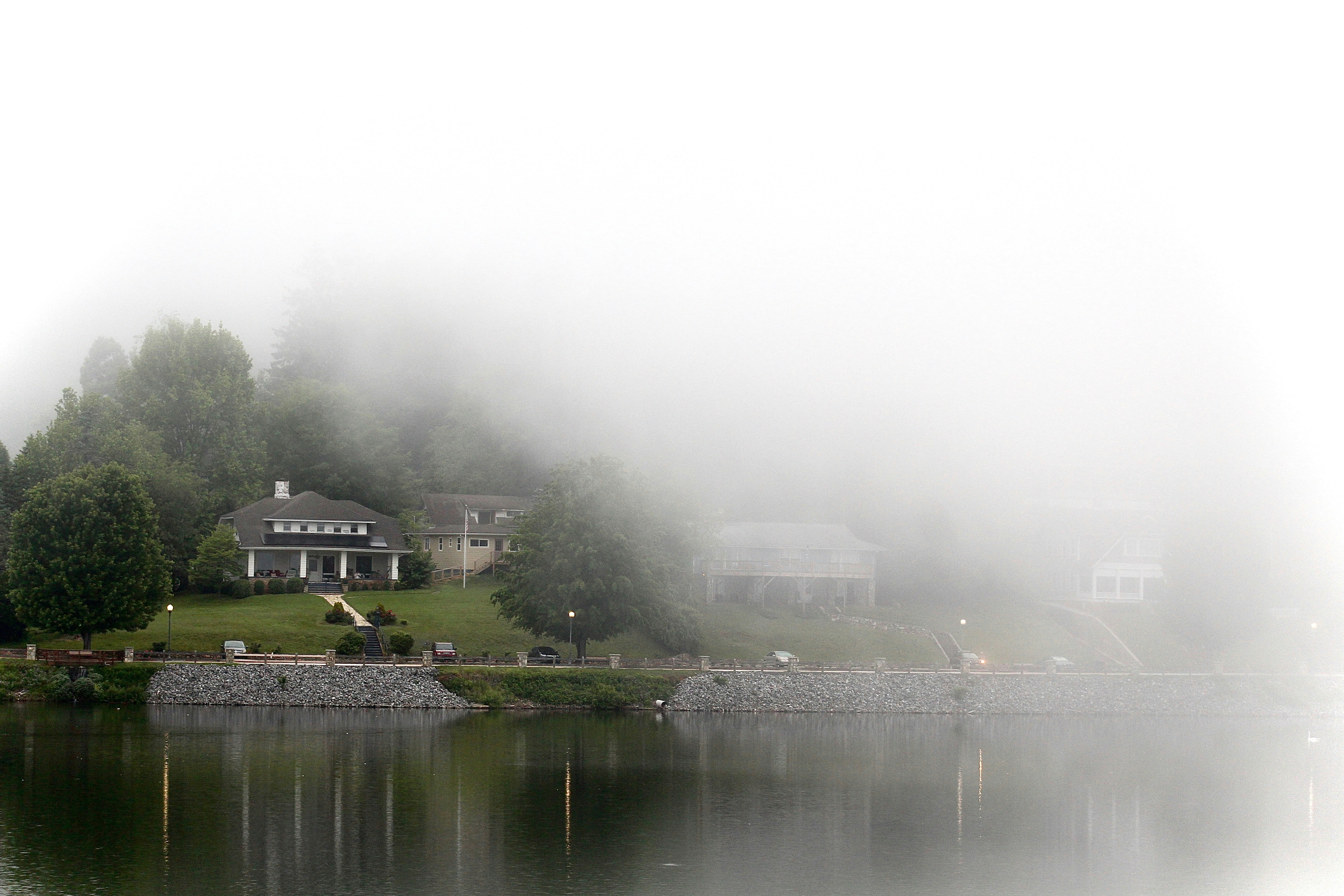 Misty Lakeside: Quiet Homes at the Fog-Washed Shore