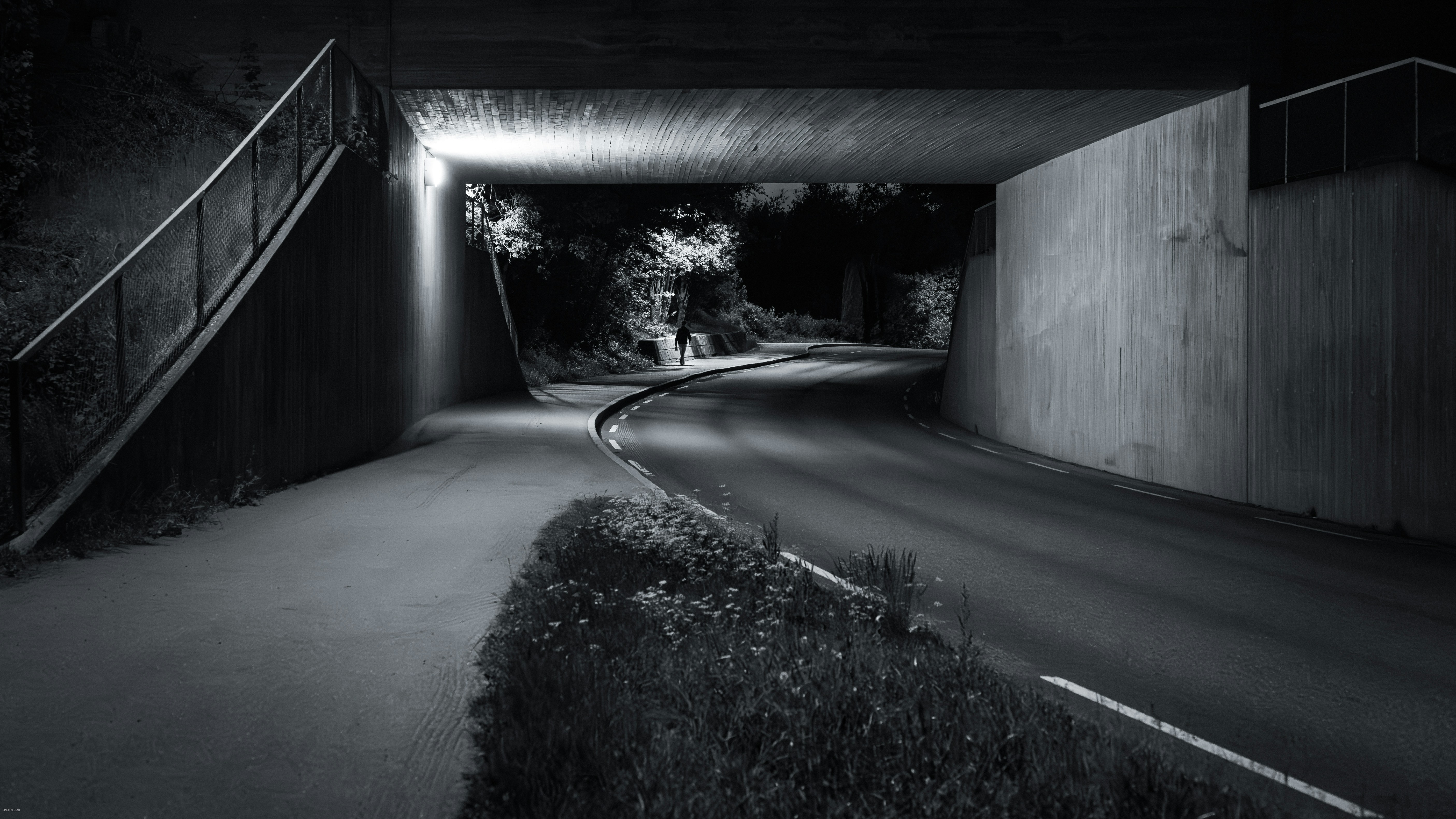 A dark and eerie road under an overpass. photo – Free Outdoor Image on ...