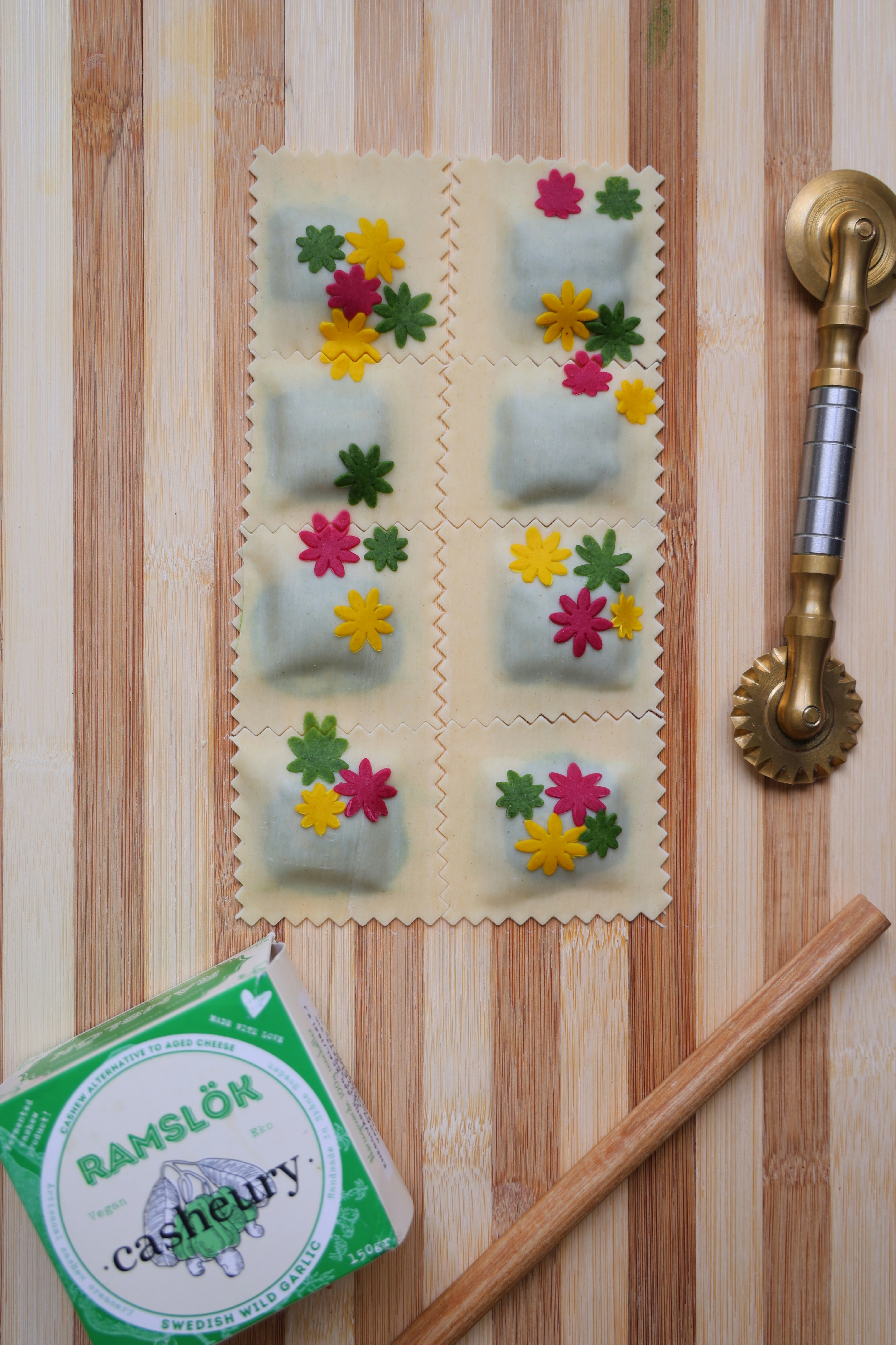 Ravioli with flower garnishes and cashew cheese. photo – Free Pasta ...